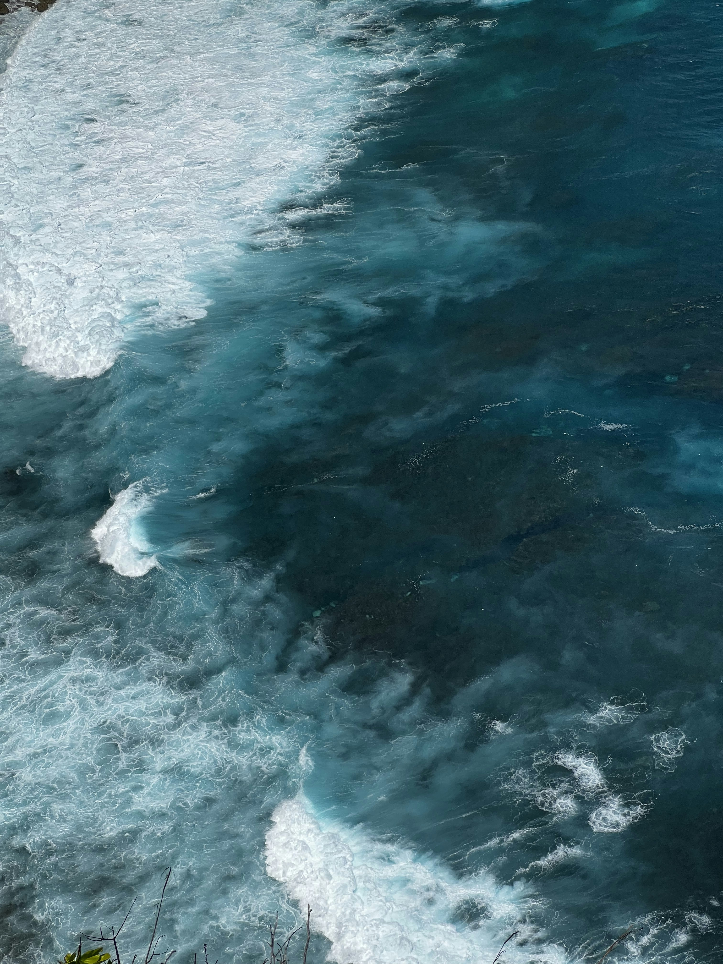 Carved Currents: An Aerial Portrait of Ocean Foam Across Deep Blue