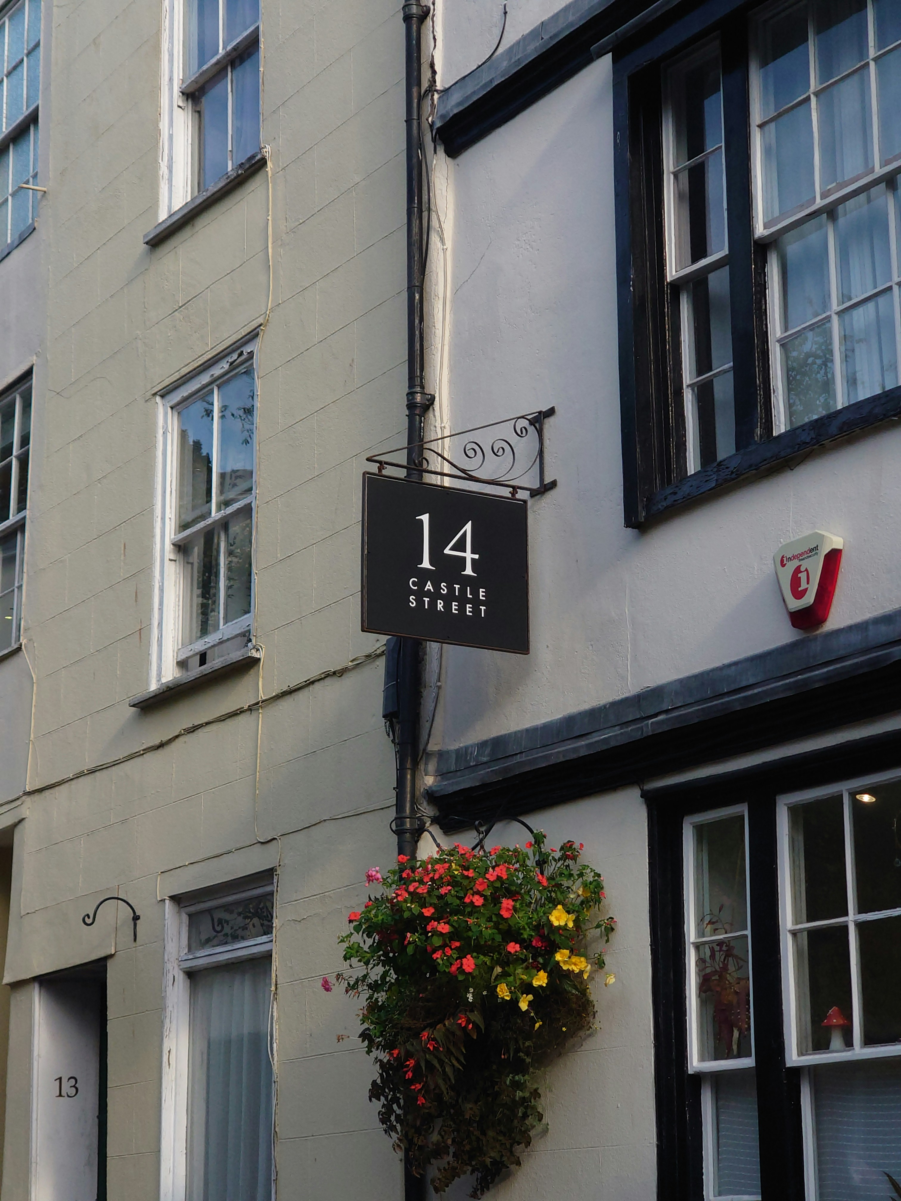 A building with a sign that says 14th street photo – Free Castle street ...