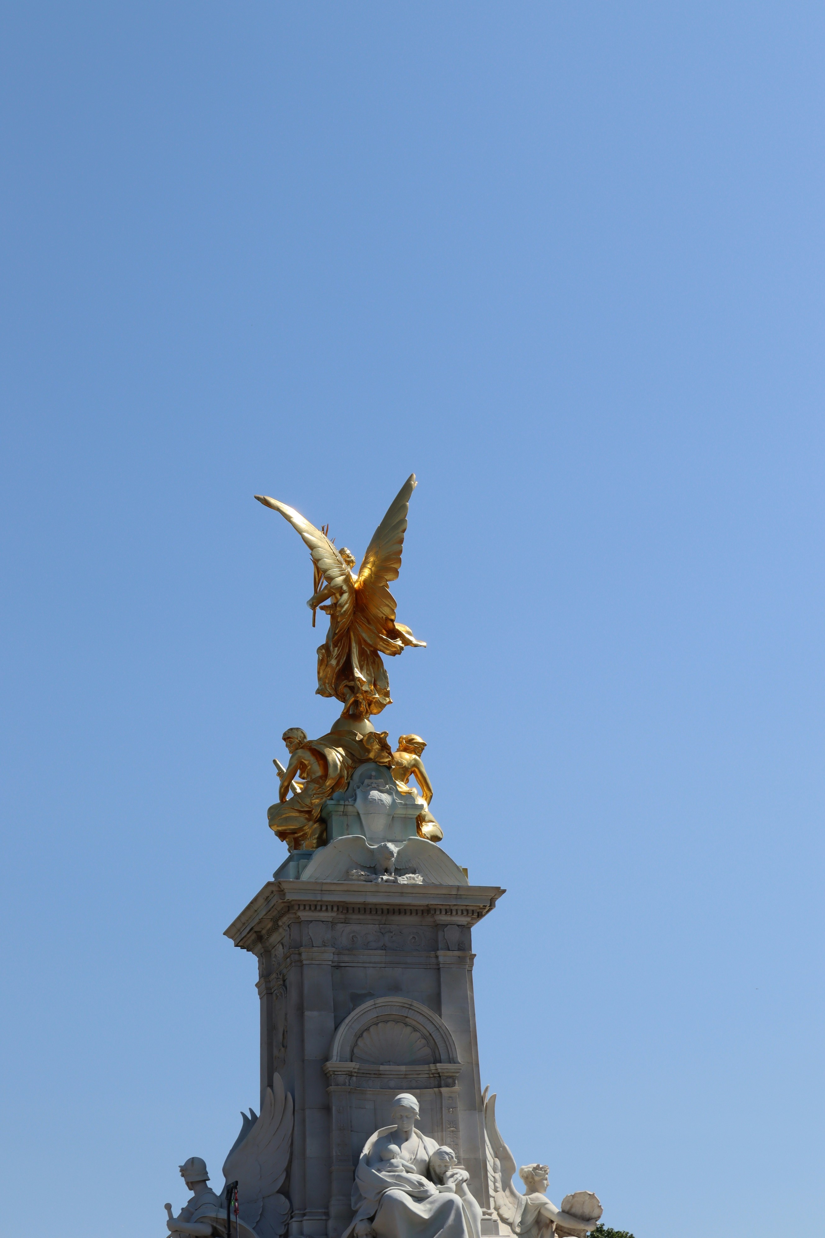 A statue of an angel on top of a building photo – Free Westminster ...