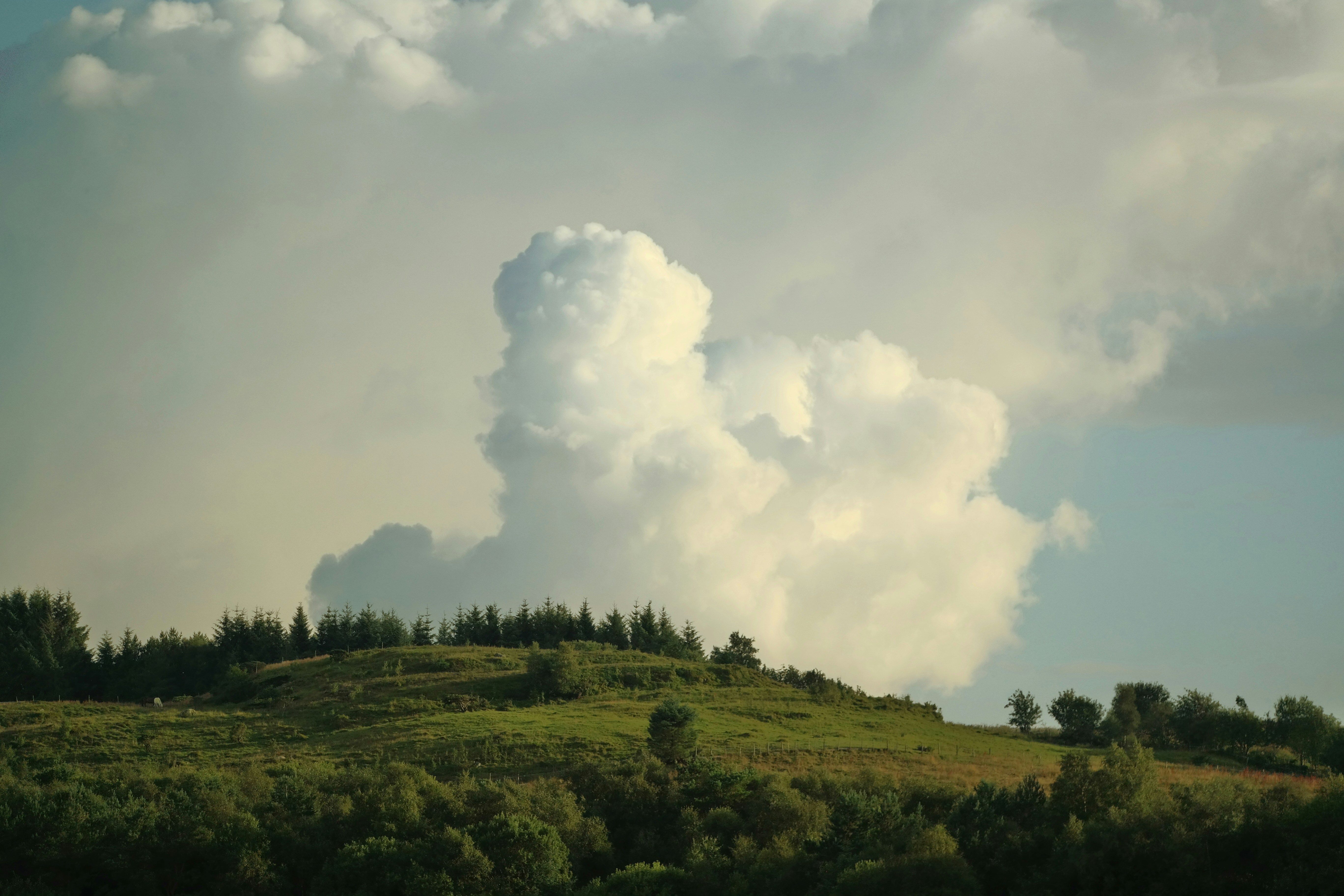 Cumulus Crown Adorns a Quiet Hillscape