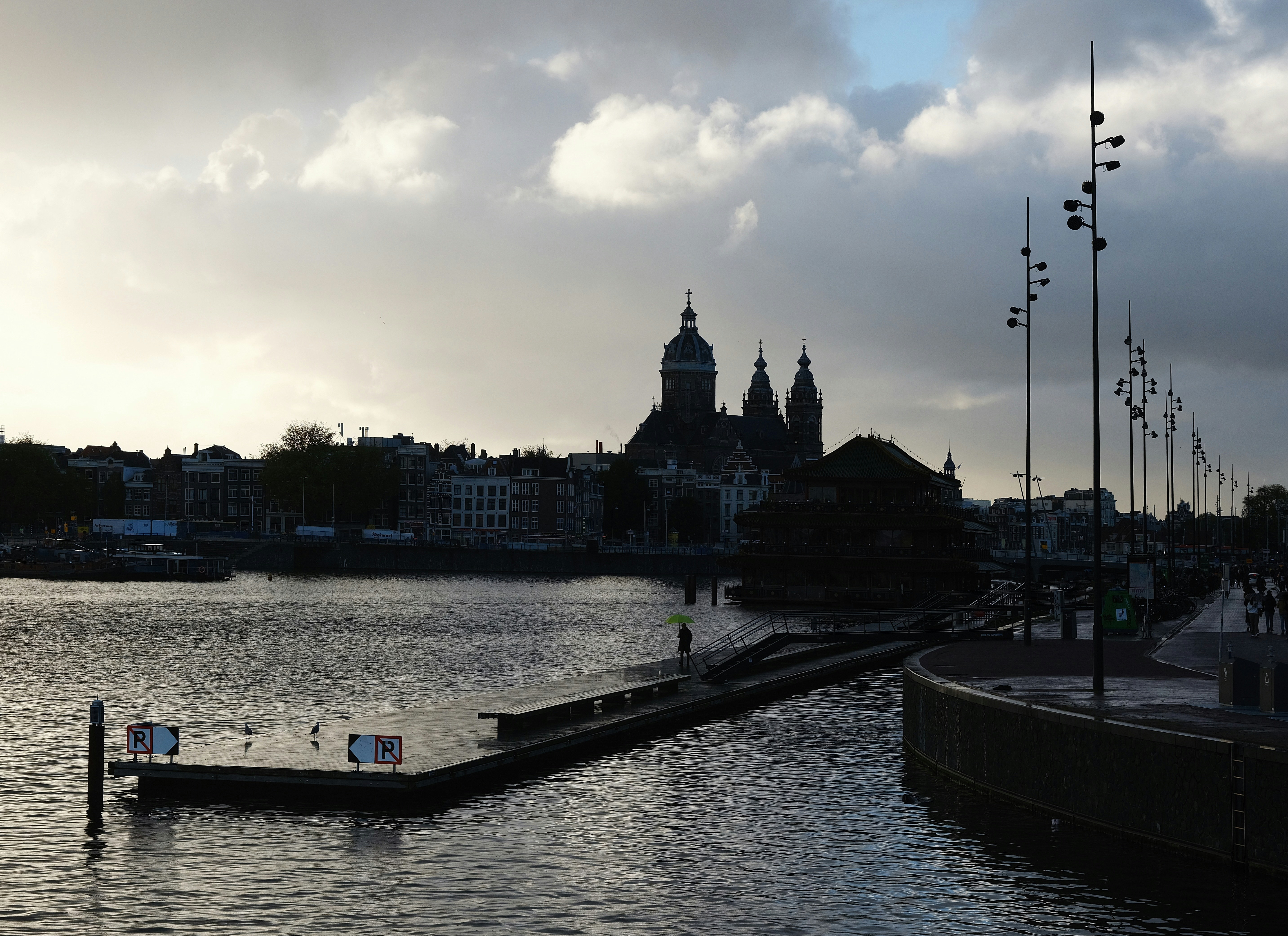 Twin Spires at Dusk Over a Quiet Riverside