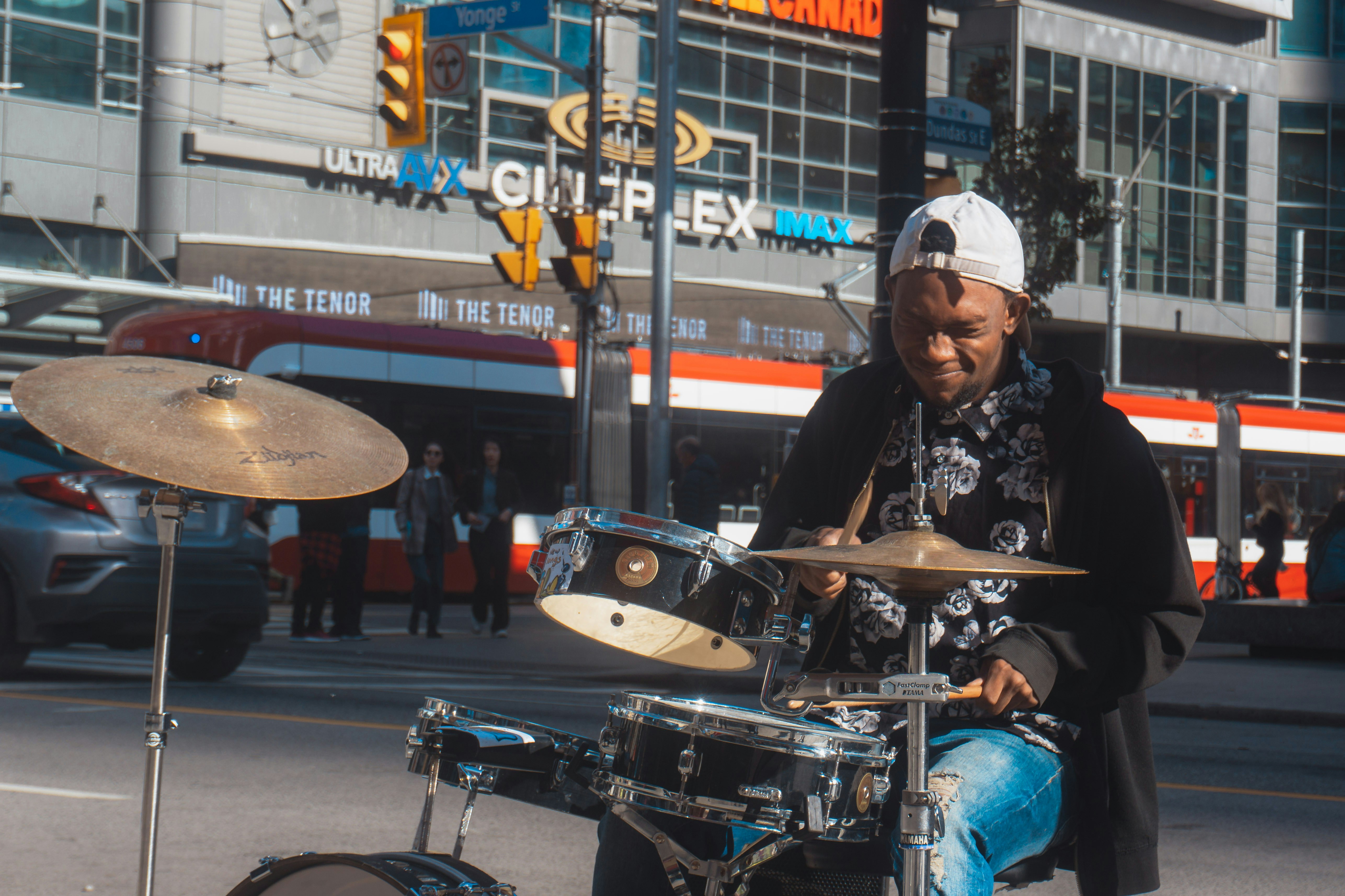 Sidewalk Cadence: Drummer Anchors the City Beat
