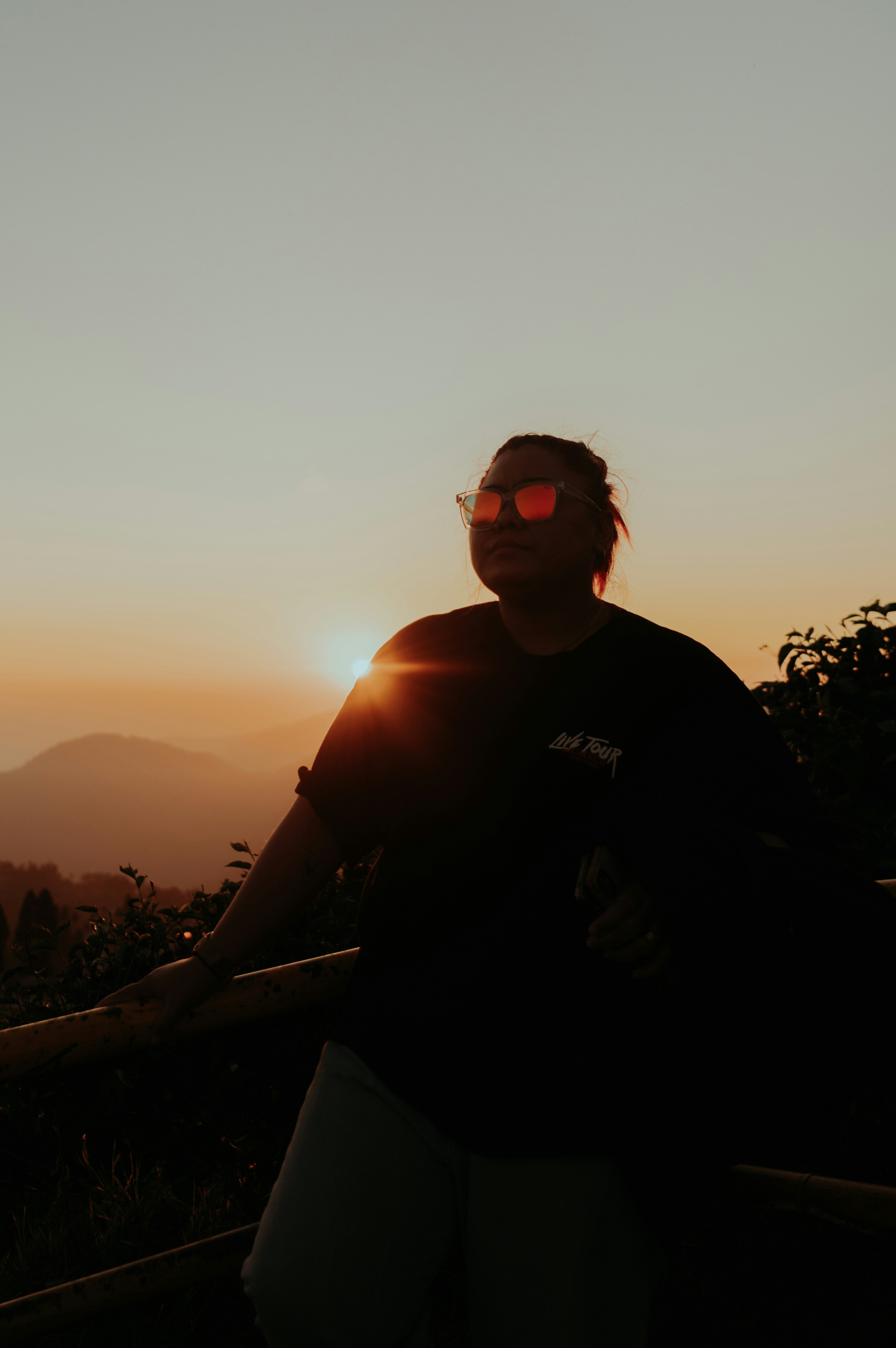 Ridge Sunset Silhouette: A Quiet Portrait in Warm Evening Light
