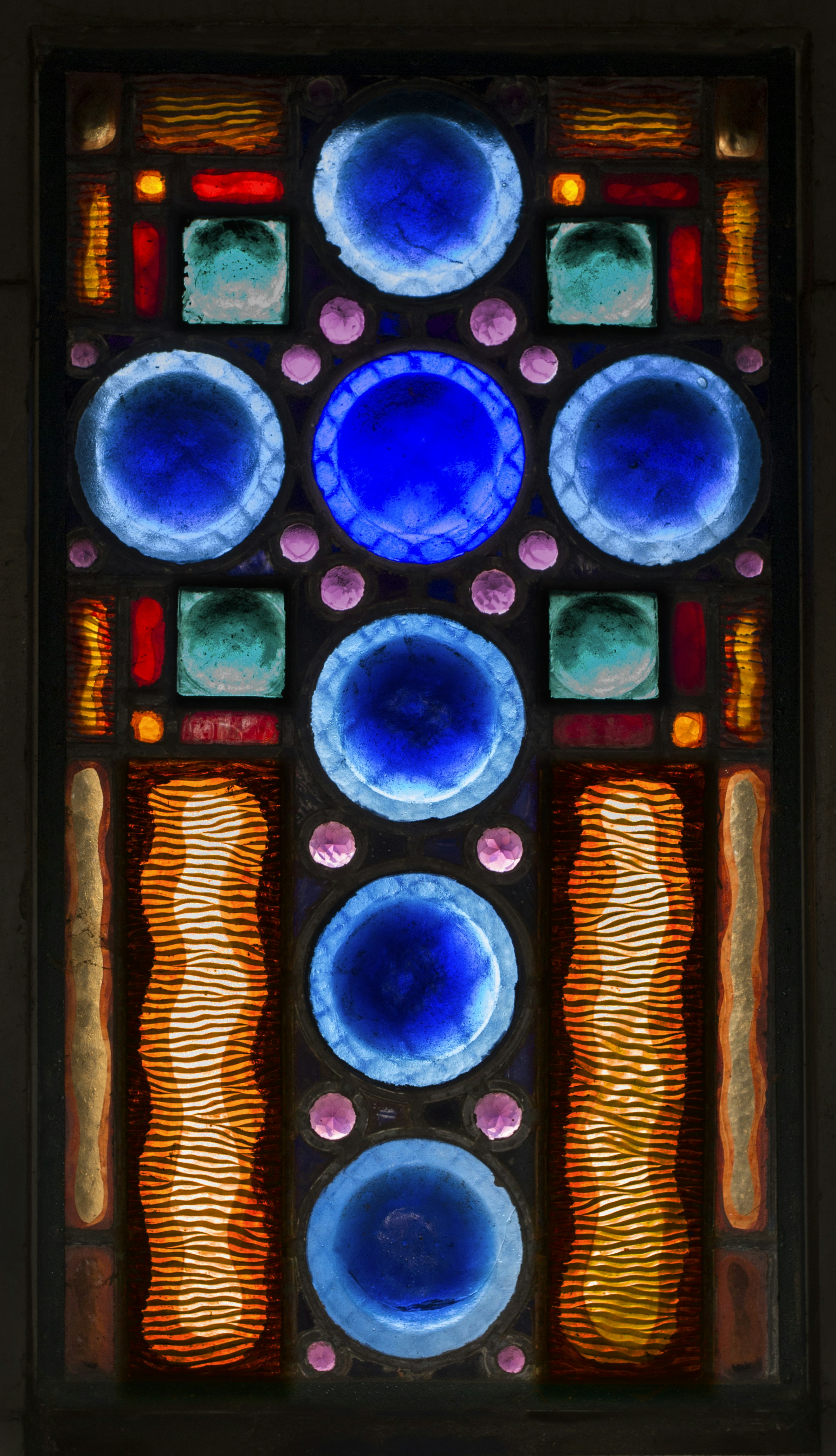Azure Orbs in a Midnight Mosaic: A Stained-Glass Vertical Array