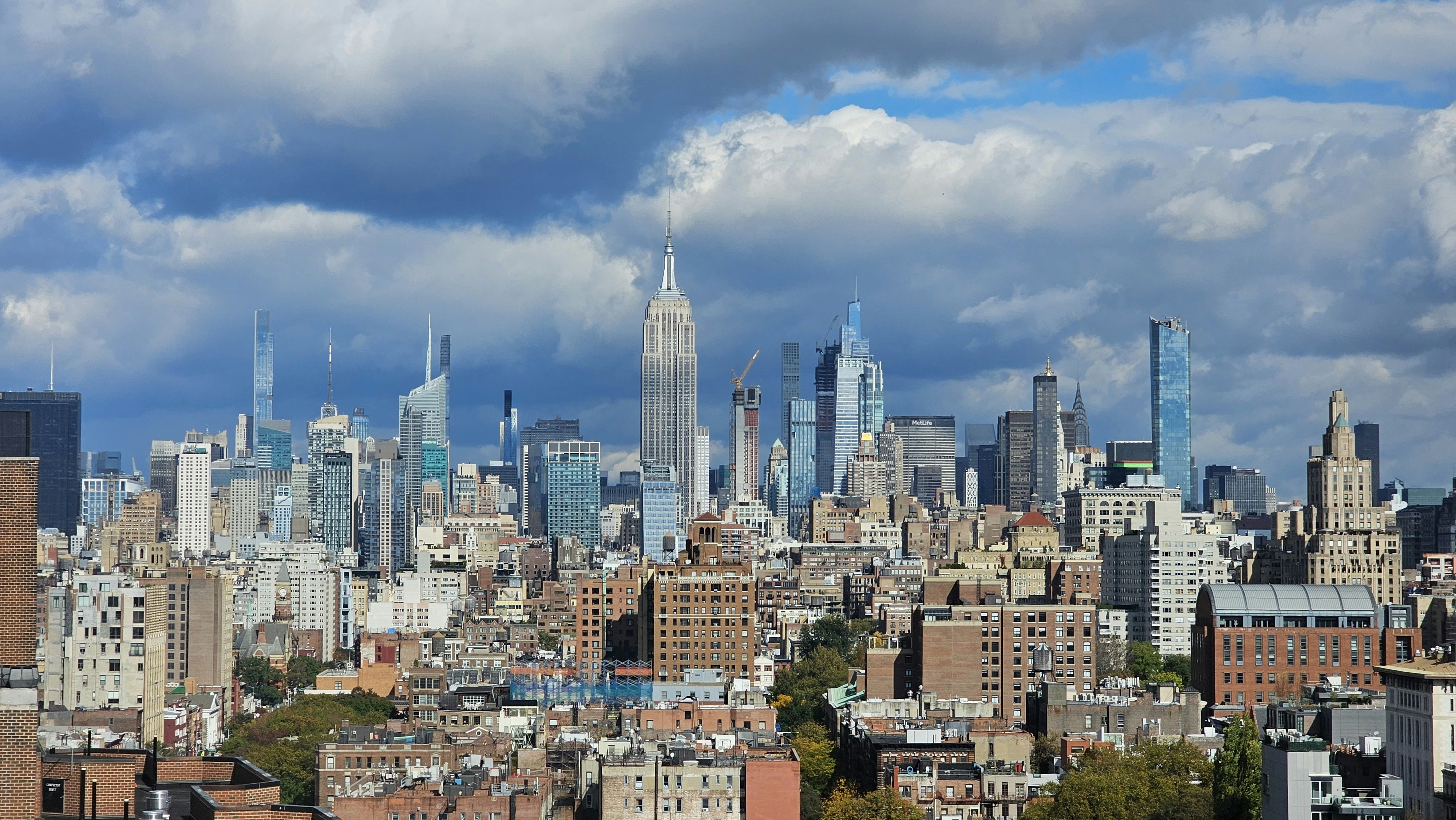 Empire of Glass and Steel: A City Skyline Rising to the Clouds