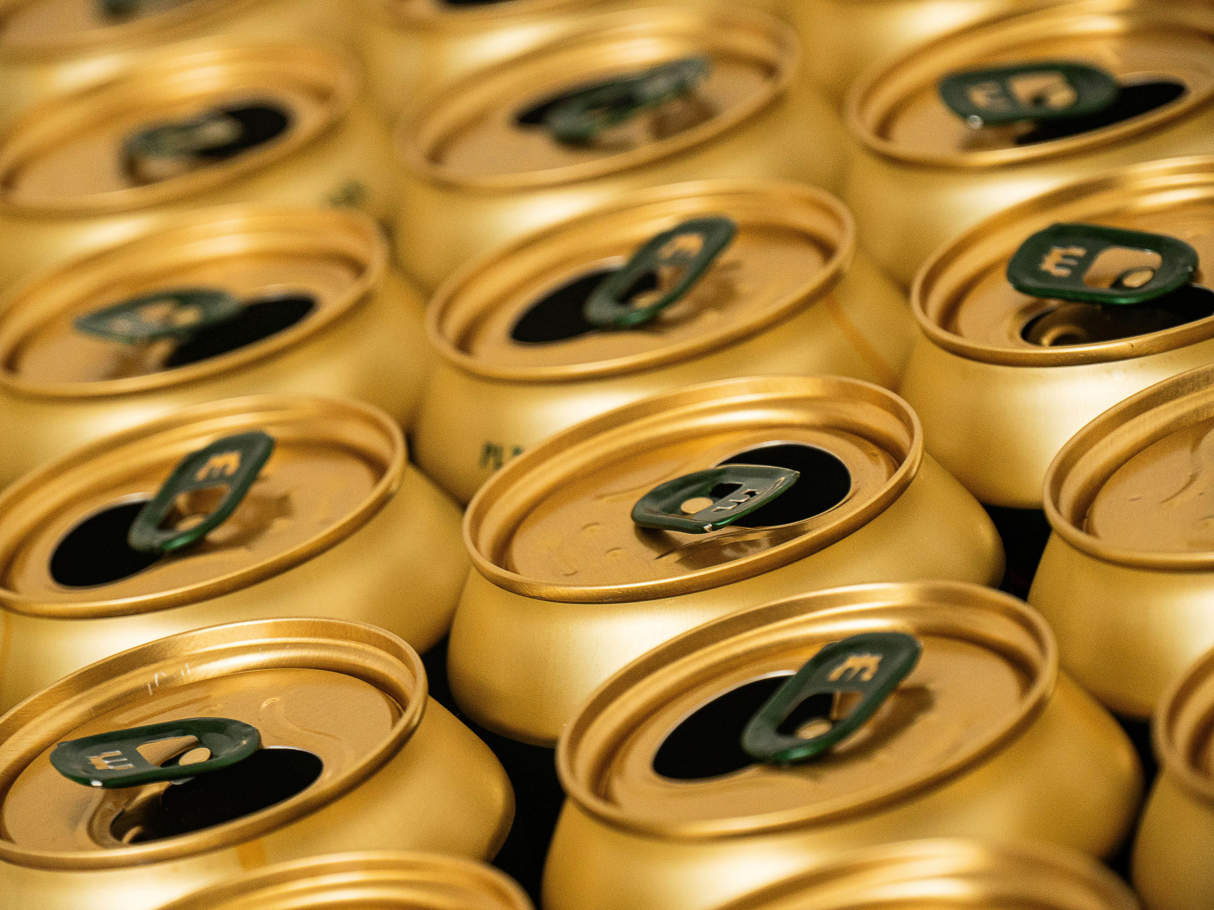 A close up of many cans of beer photo – Free Texture Image on Unsplash