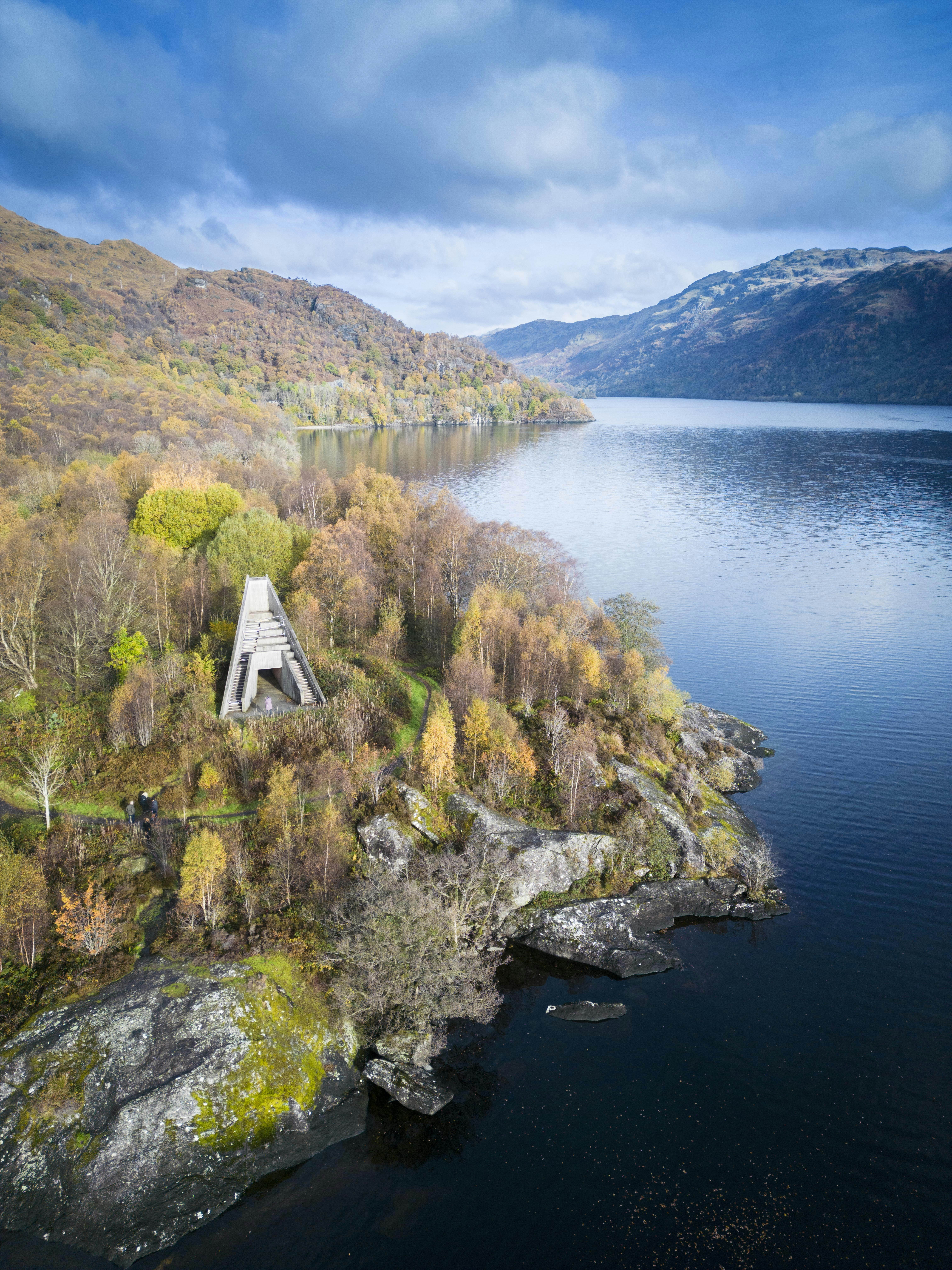 An aerial view of a bridge over a body of water photo – Free Loch ...