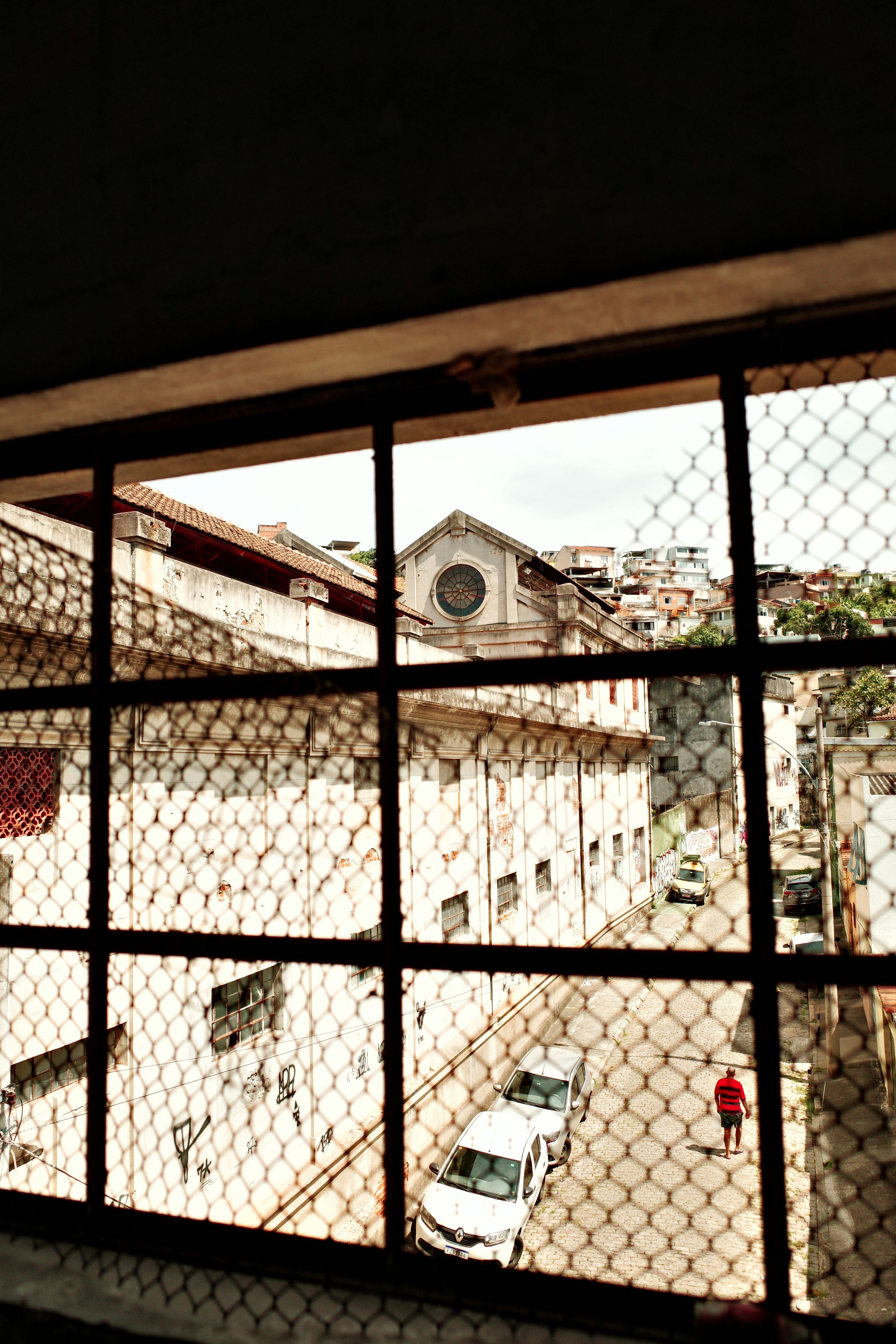 A view of a street through a window photo – Free Rio de janeiro Image ...
