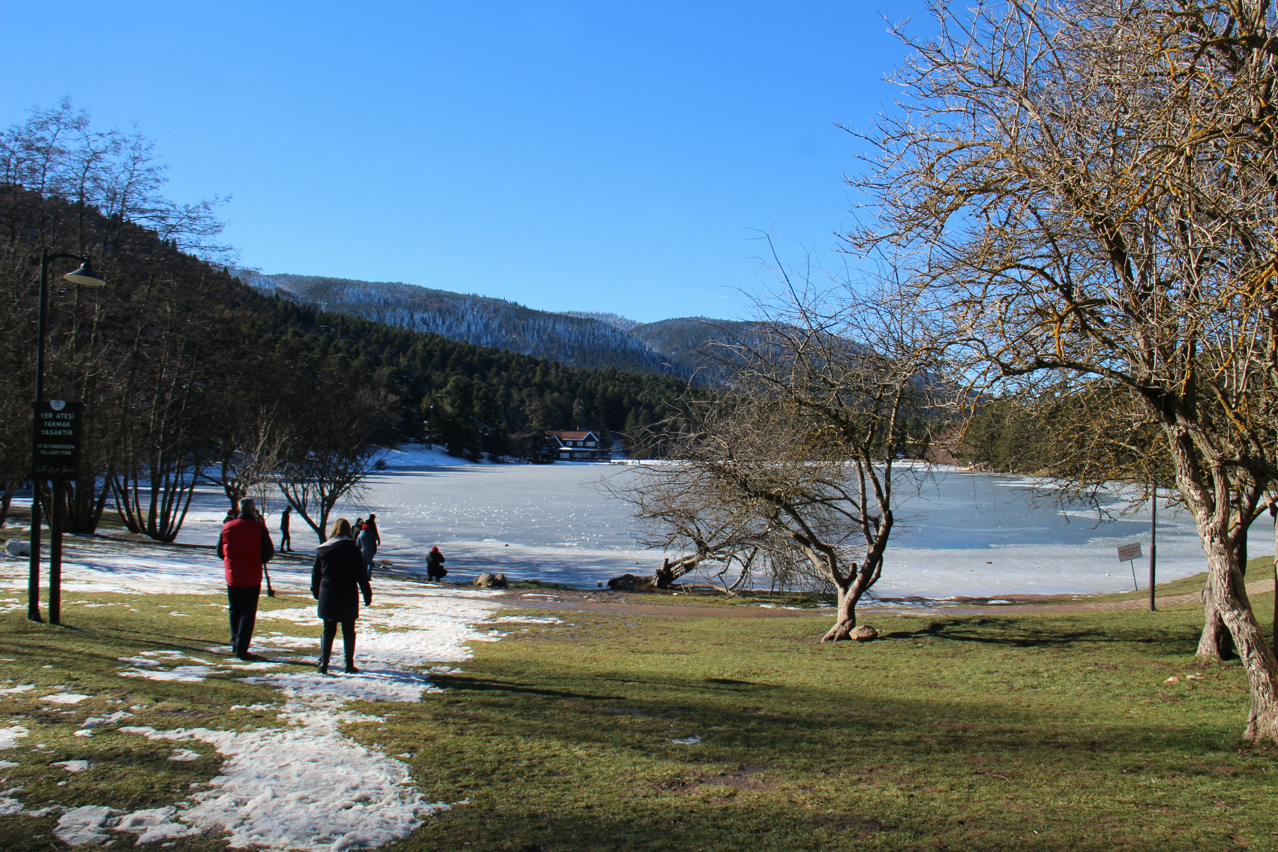 pictures that came from a dusty box | a couple of people that are walking in the snow
