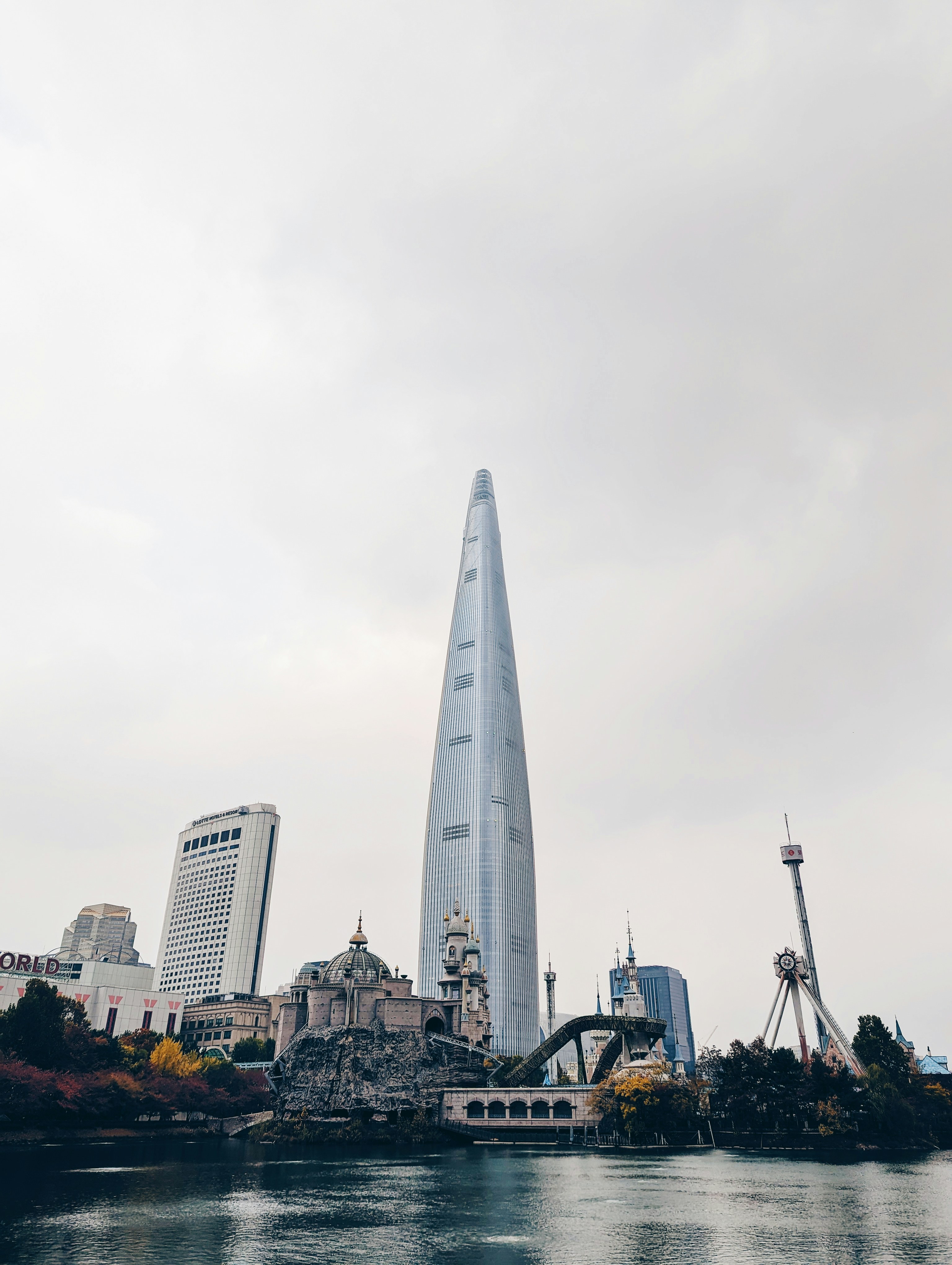 Spear of Glass: Seoul's Lotte World Tower Rises Over a Misty Han River Skyline
