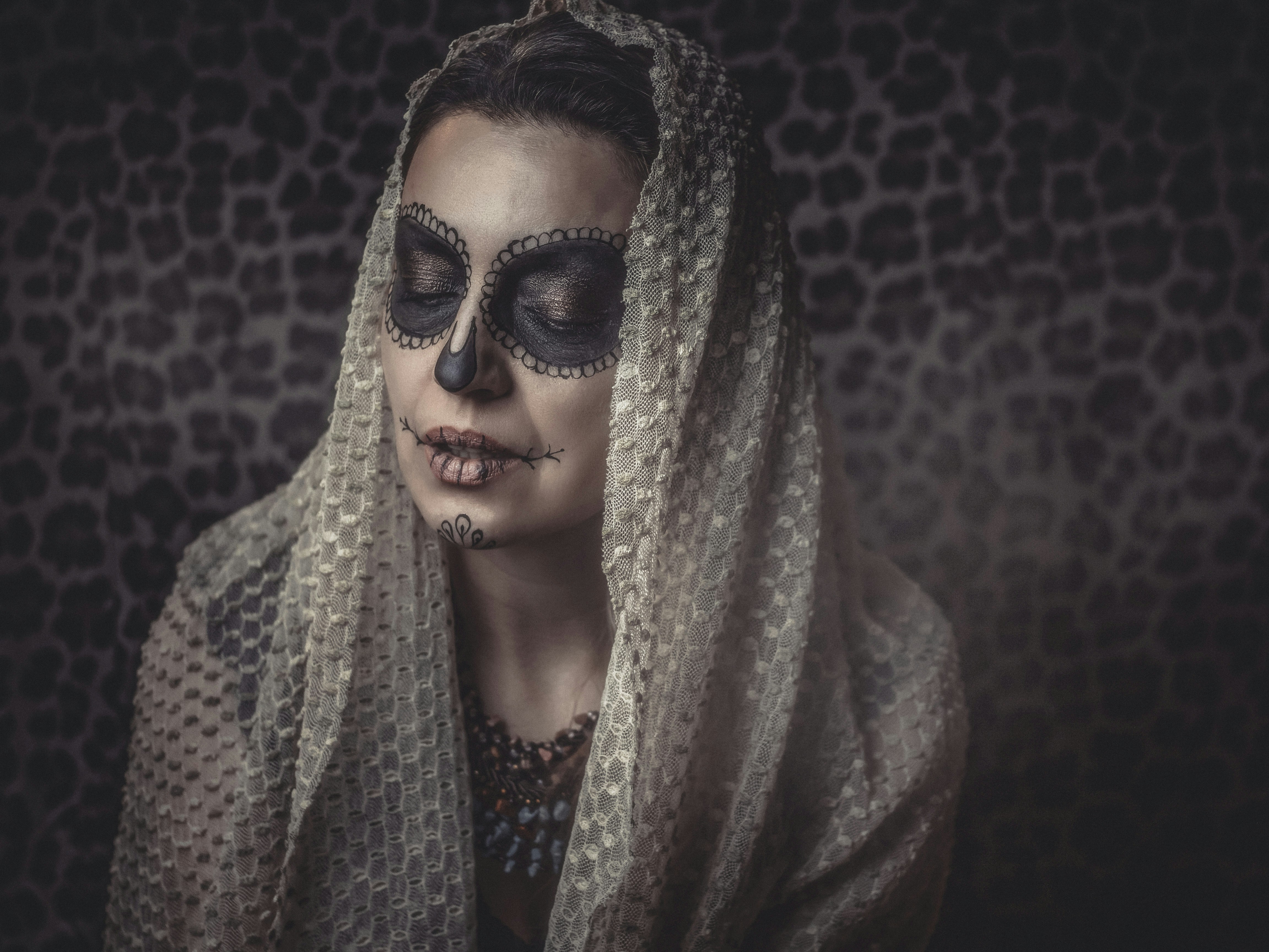 A woman with a skeleton make up on her face photo – Free Portrait Image ...