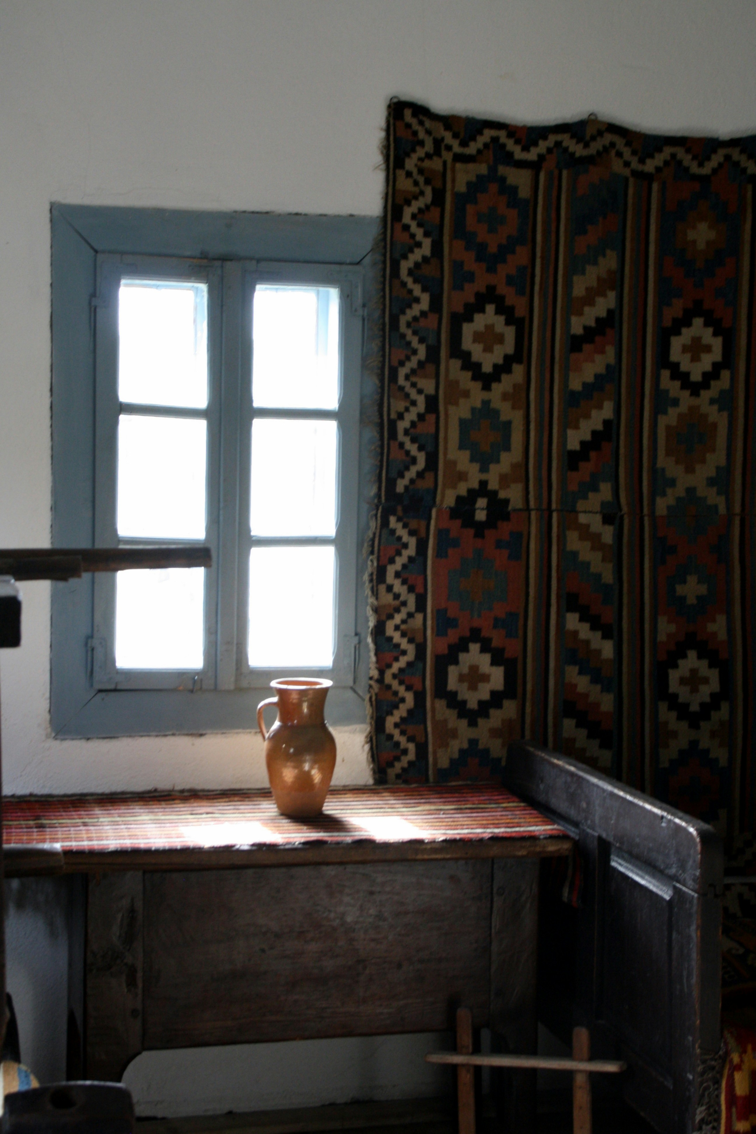 Ceramic Jug in a Sunlit Folk Room