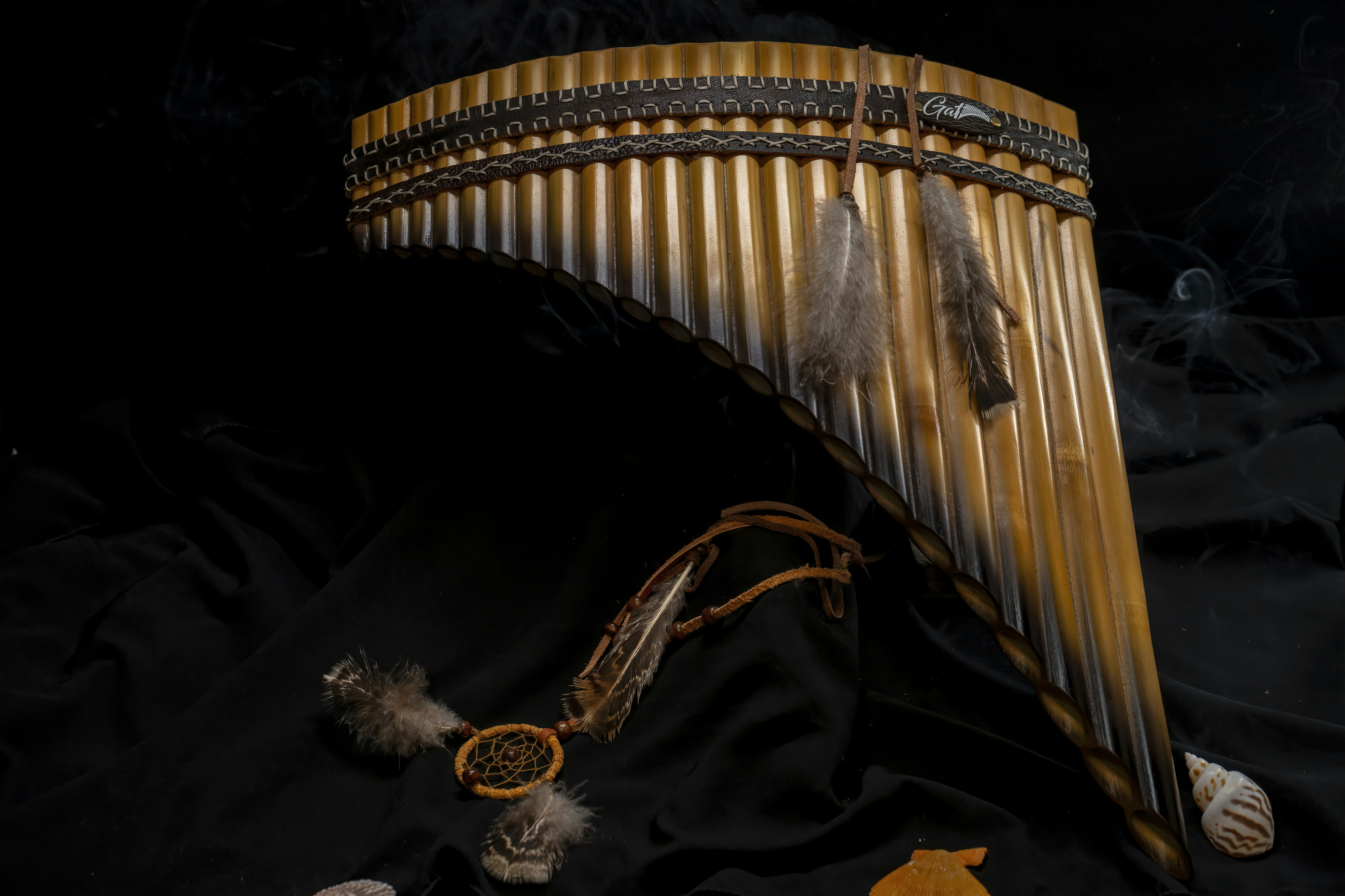 A close up of a musical instrument on a black background photo – Free ...
