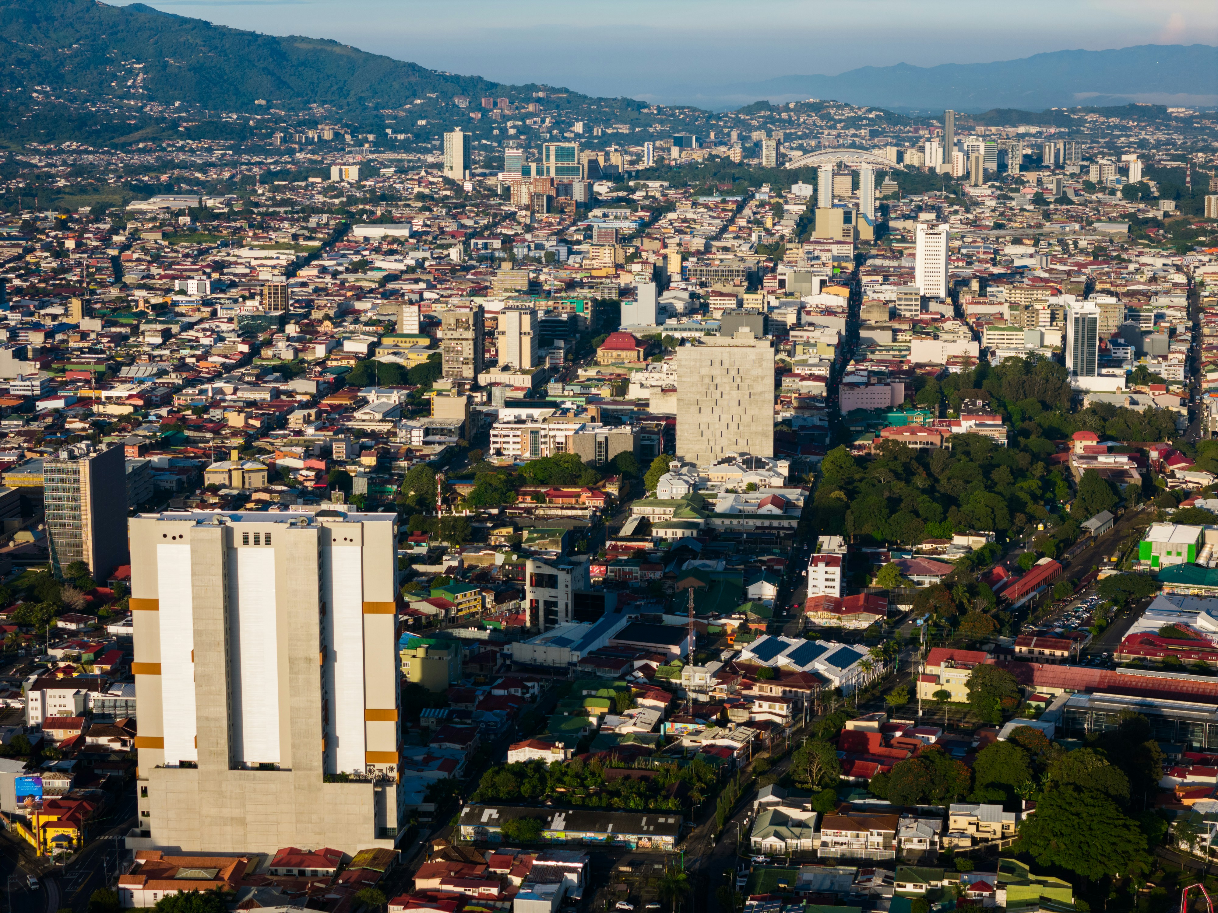 An aerial view of a city with tall buildings photo – Free Costa rica ...