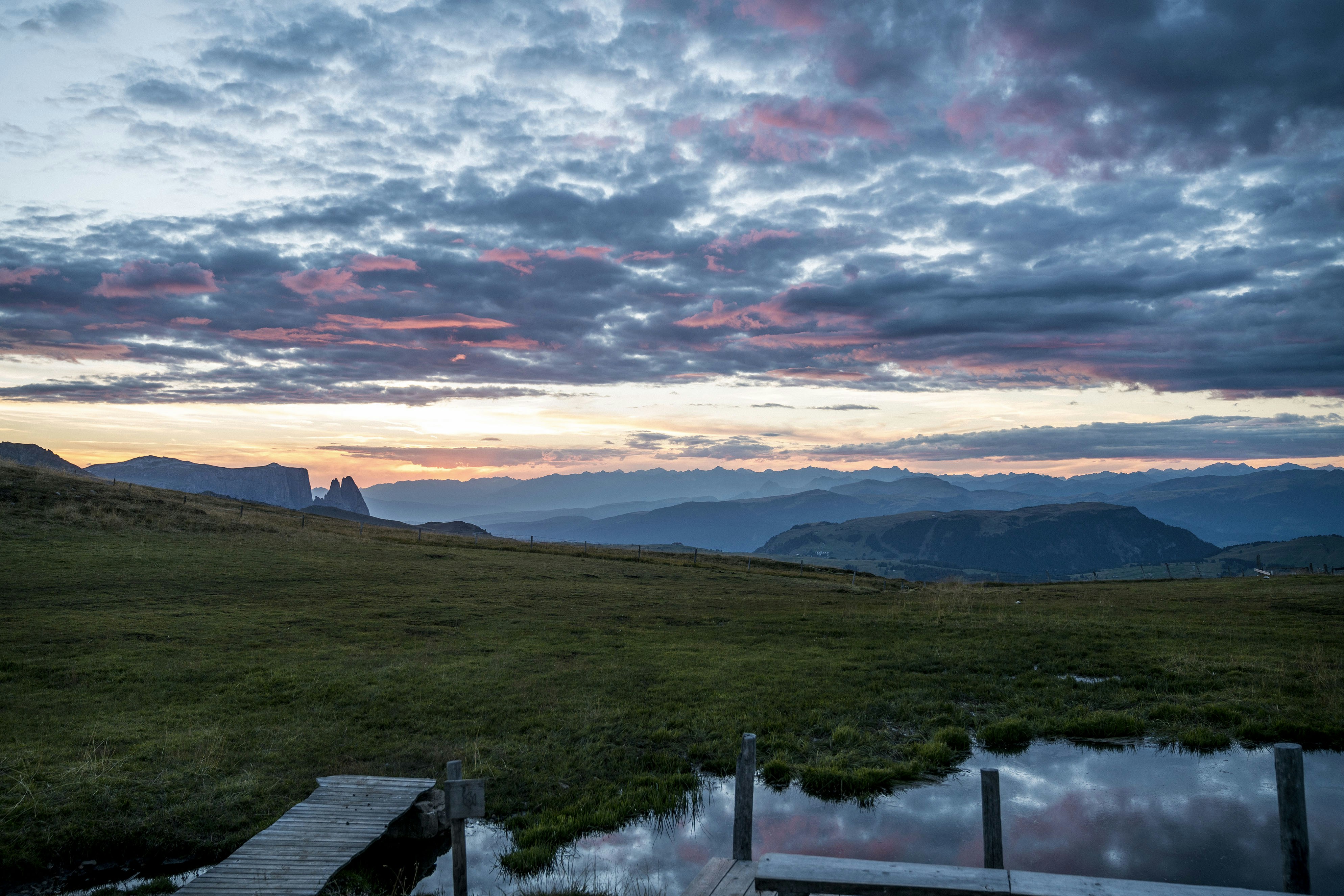 Dusk on the Moor: A Weathered Dock Framing the Quiet Horizon