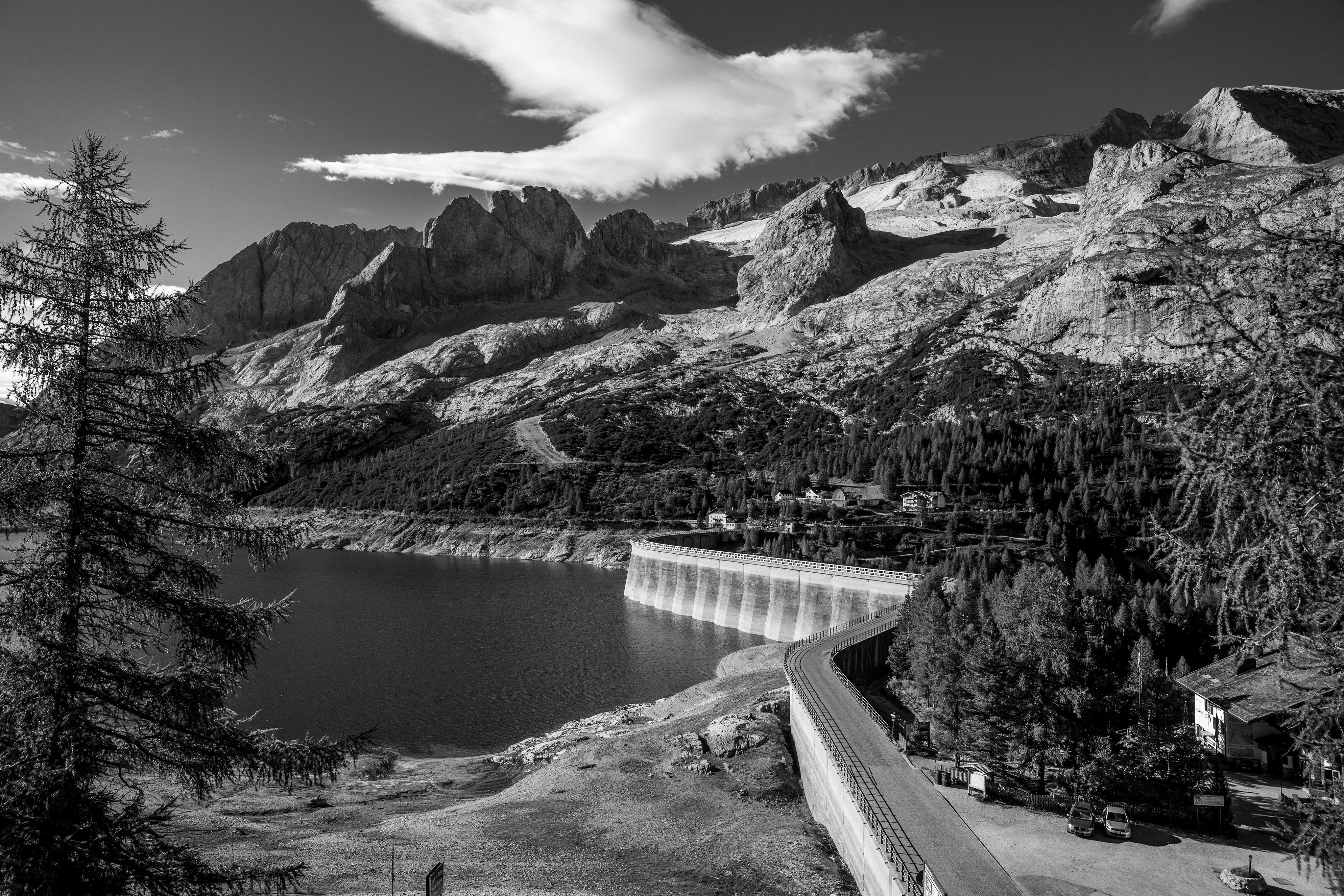 Dam by the Alpine Reservoir: Quiet Monochrome