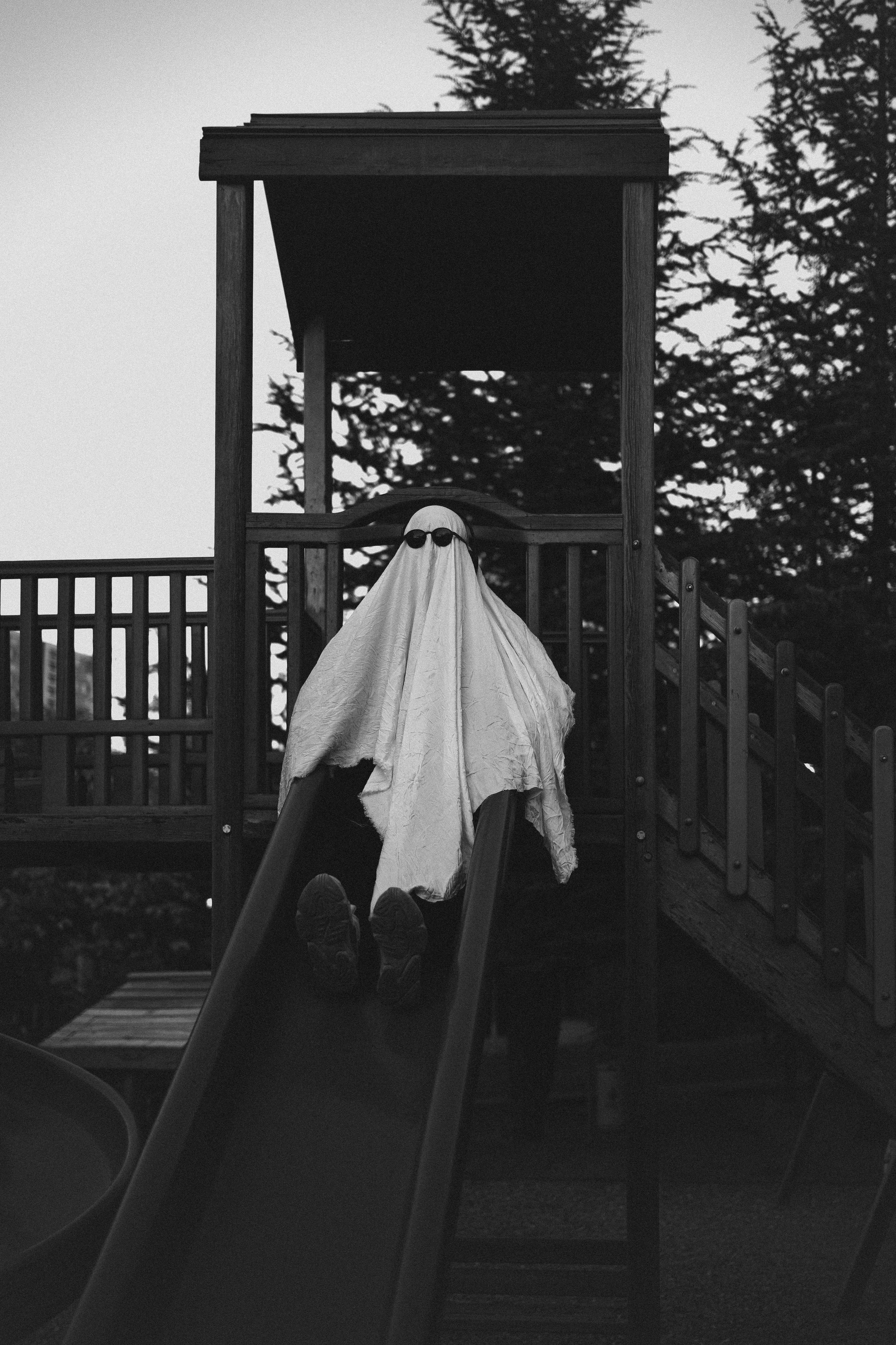 Slide of Shadows: Ghostly Guest on the Playground Slide