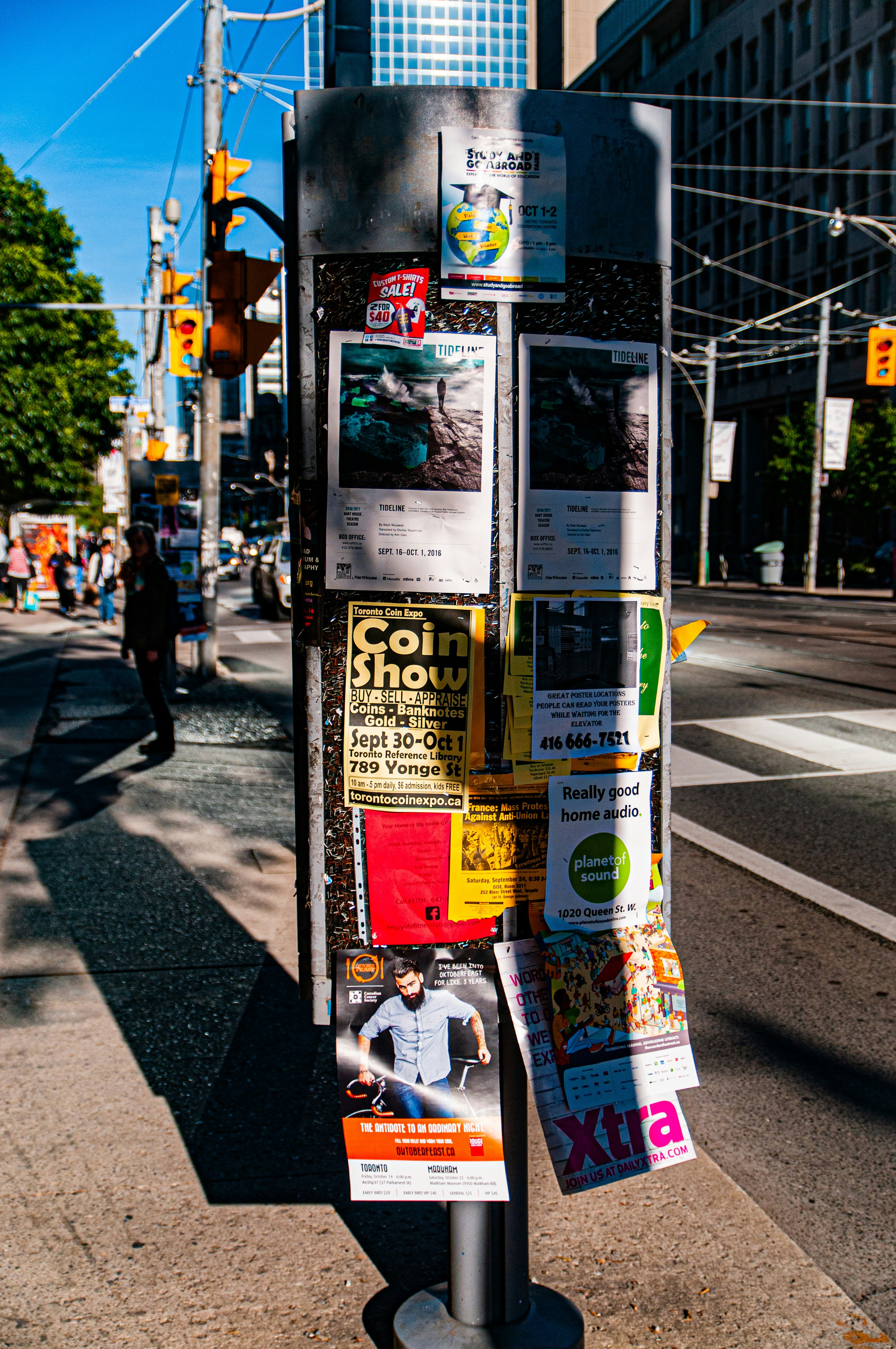 A parking meter with a bunch of stickers on it photo – Free ...