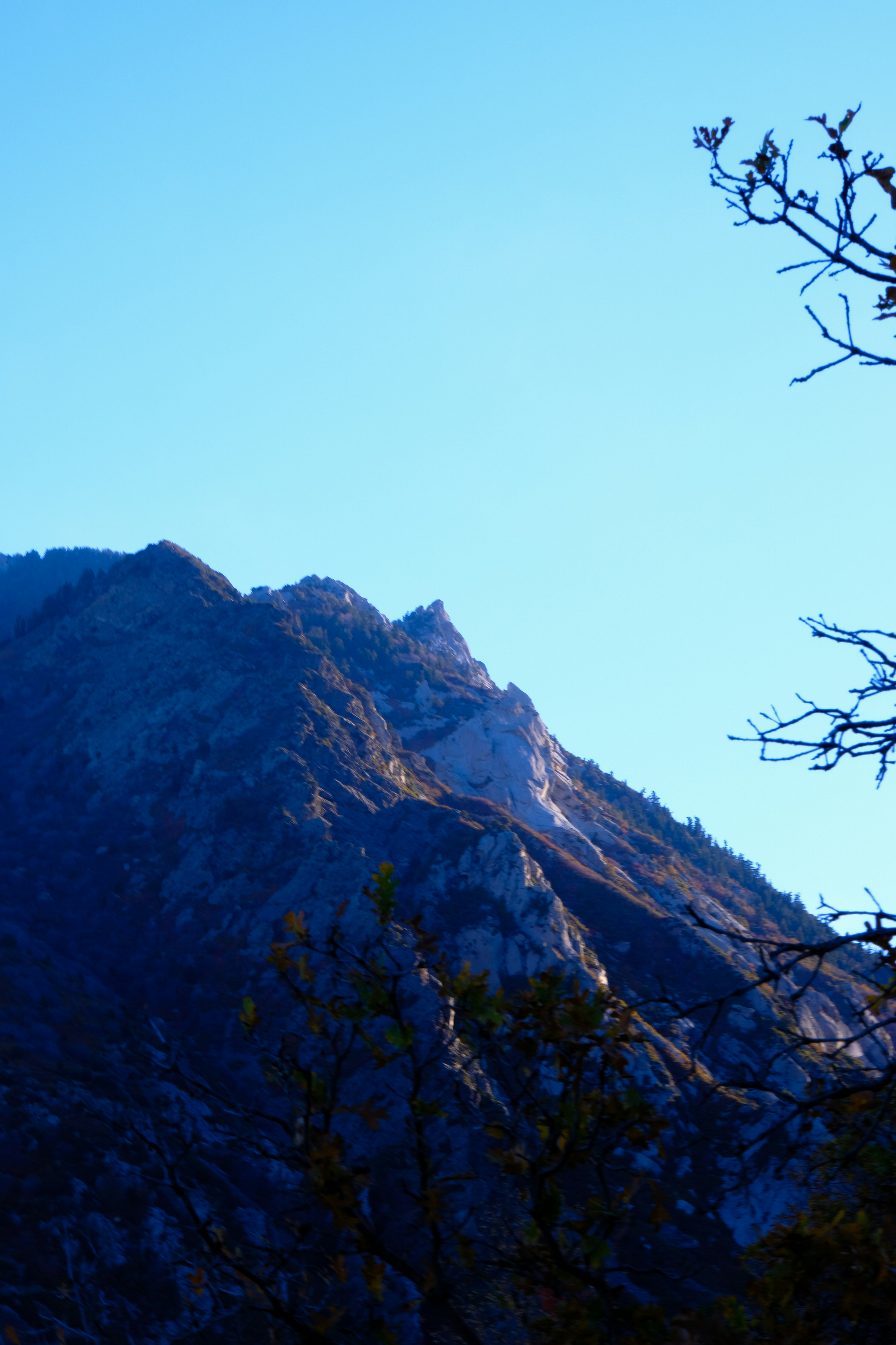 A view of the top of a mountain from below photo – Free Lower bell ...