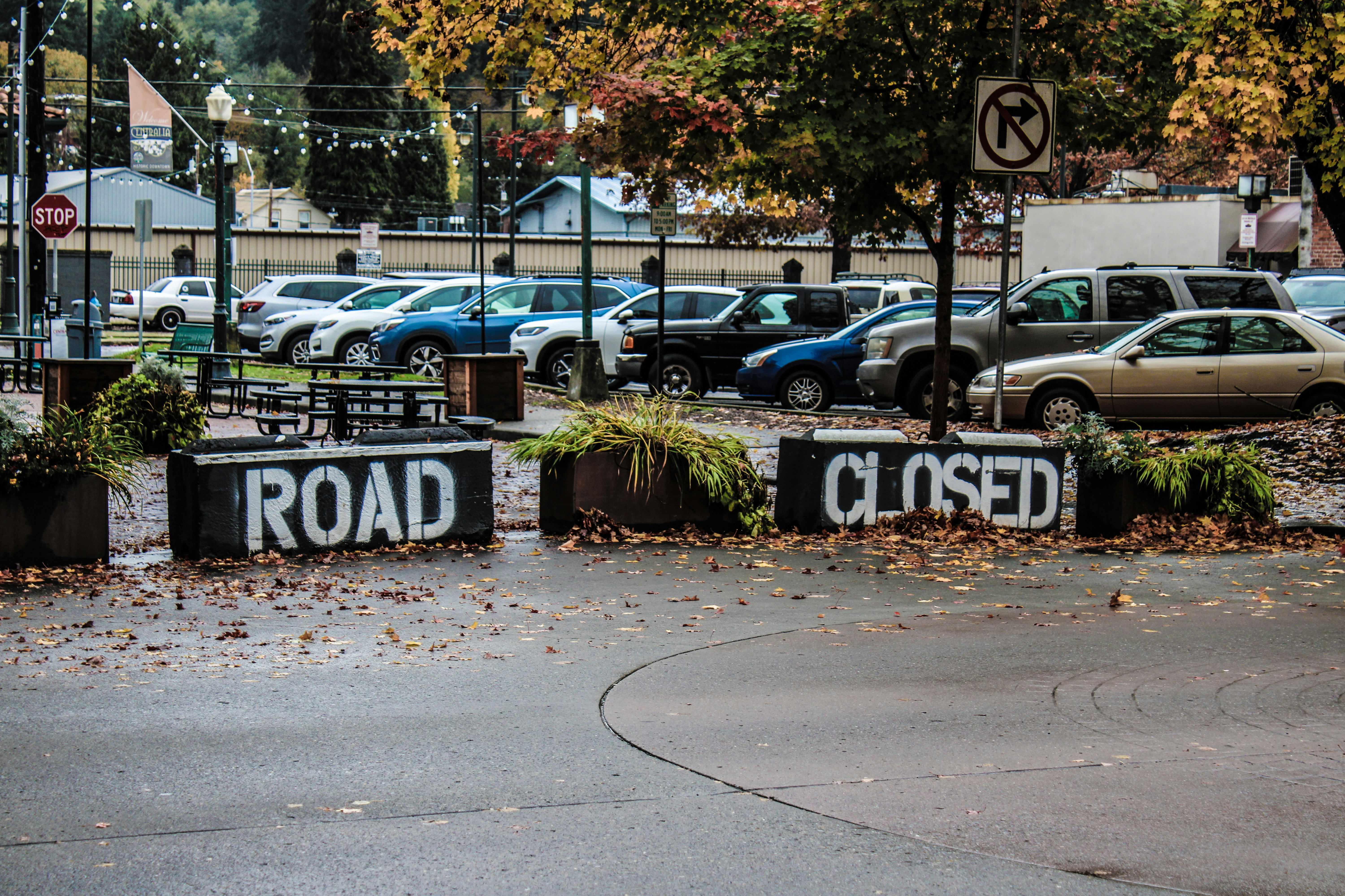 Road Closed Signage Framing a Quiet Parking Lot