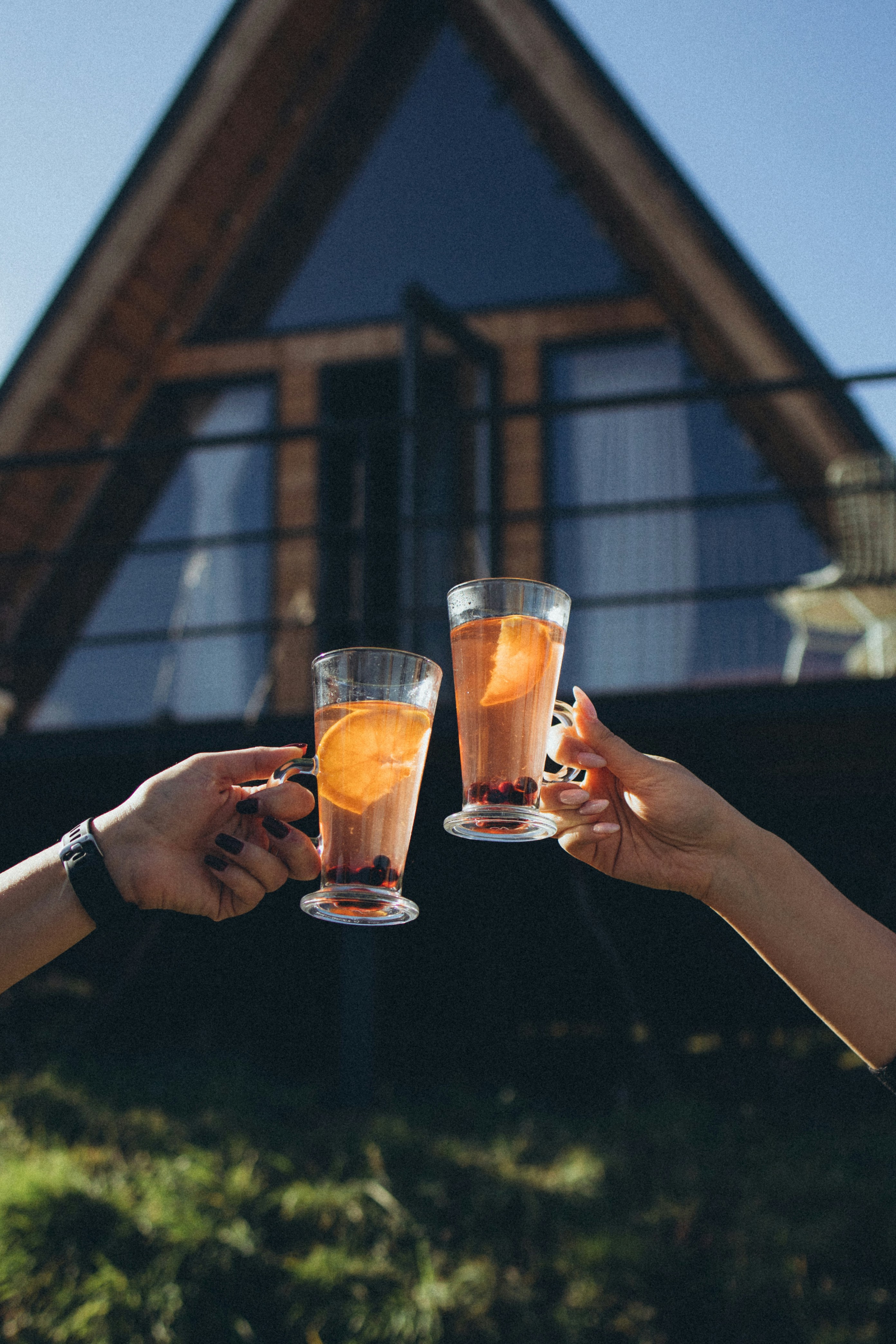 Chalet Toasts: Citrus Cheers Before an A-Frame Facade