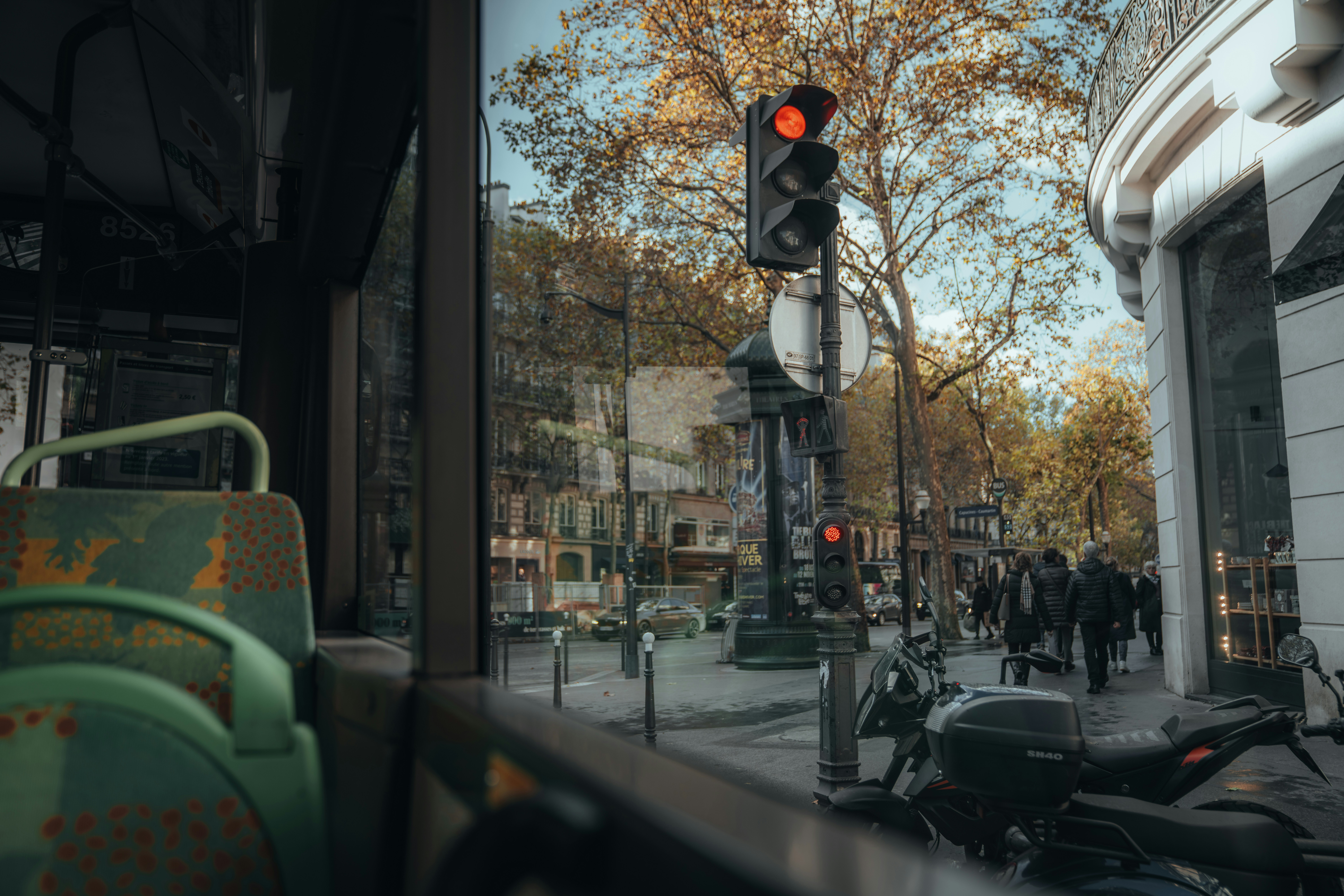 A red traffic light sitting on the side of a road photo – Free City ...