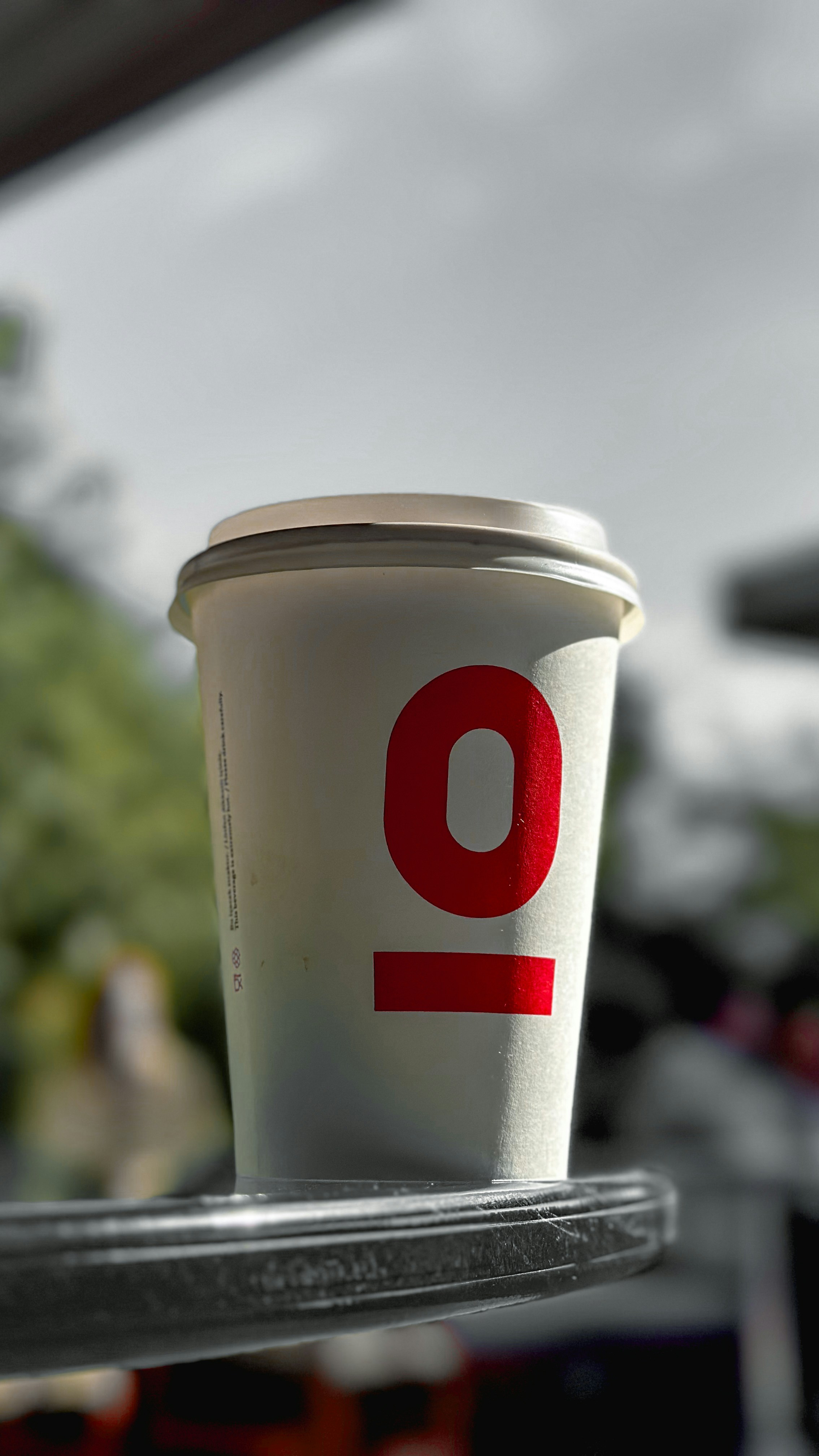 A Solo Coffee Cup Anchors a Bright Morning Scene