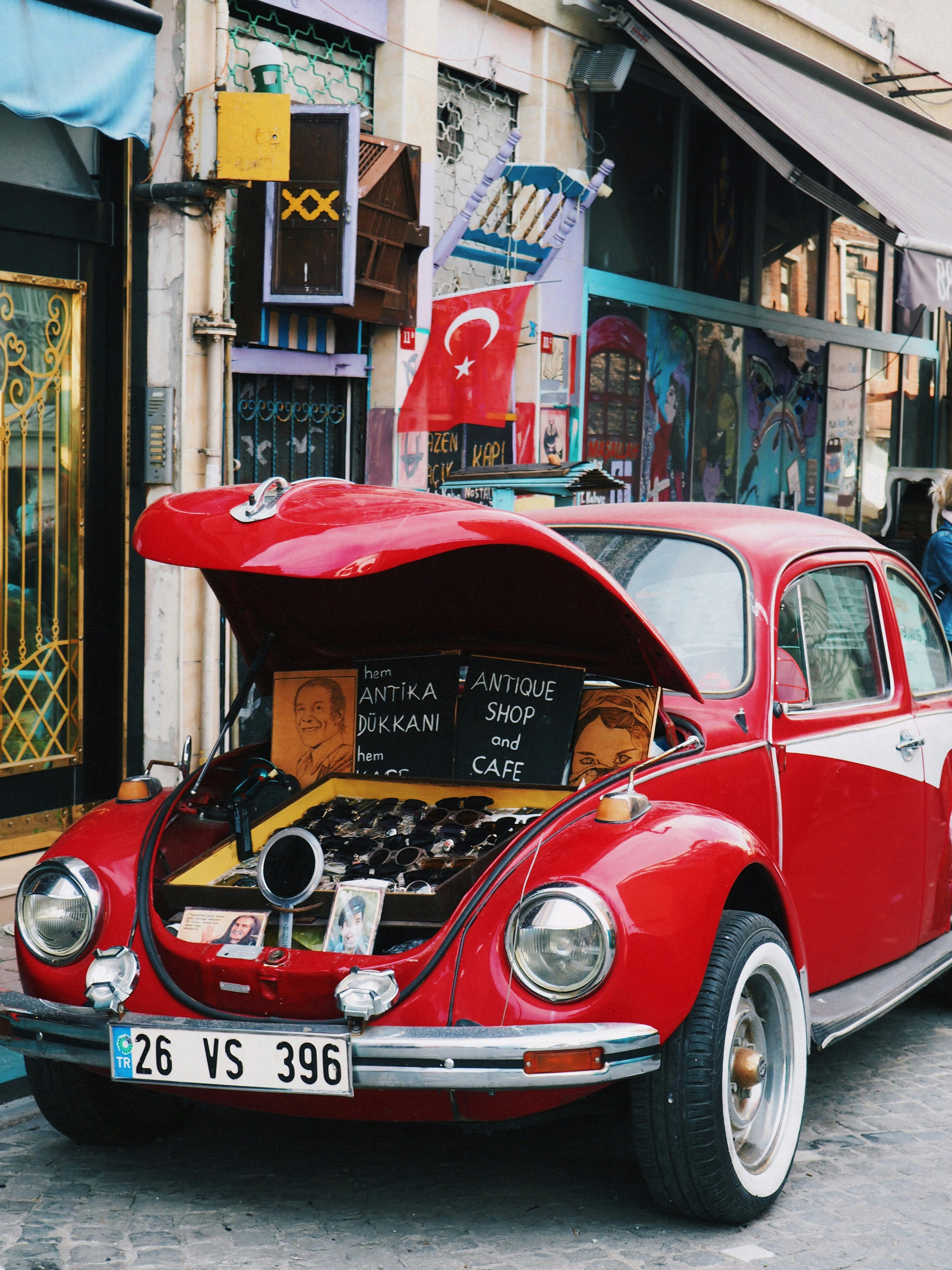 Open-Trunk Antiquarian Display on a Colorful Turkish Street