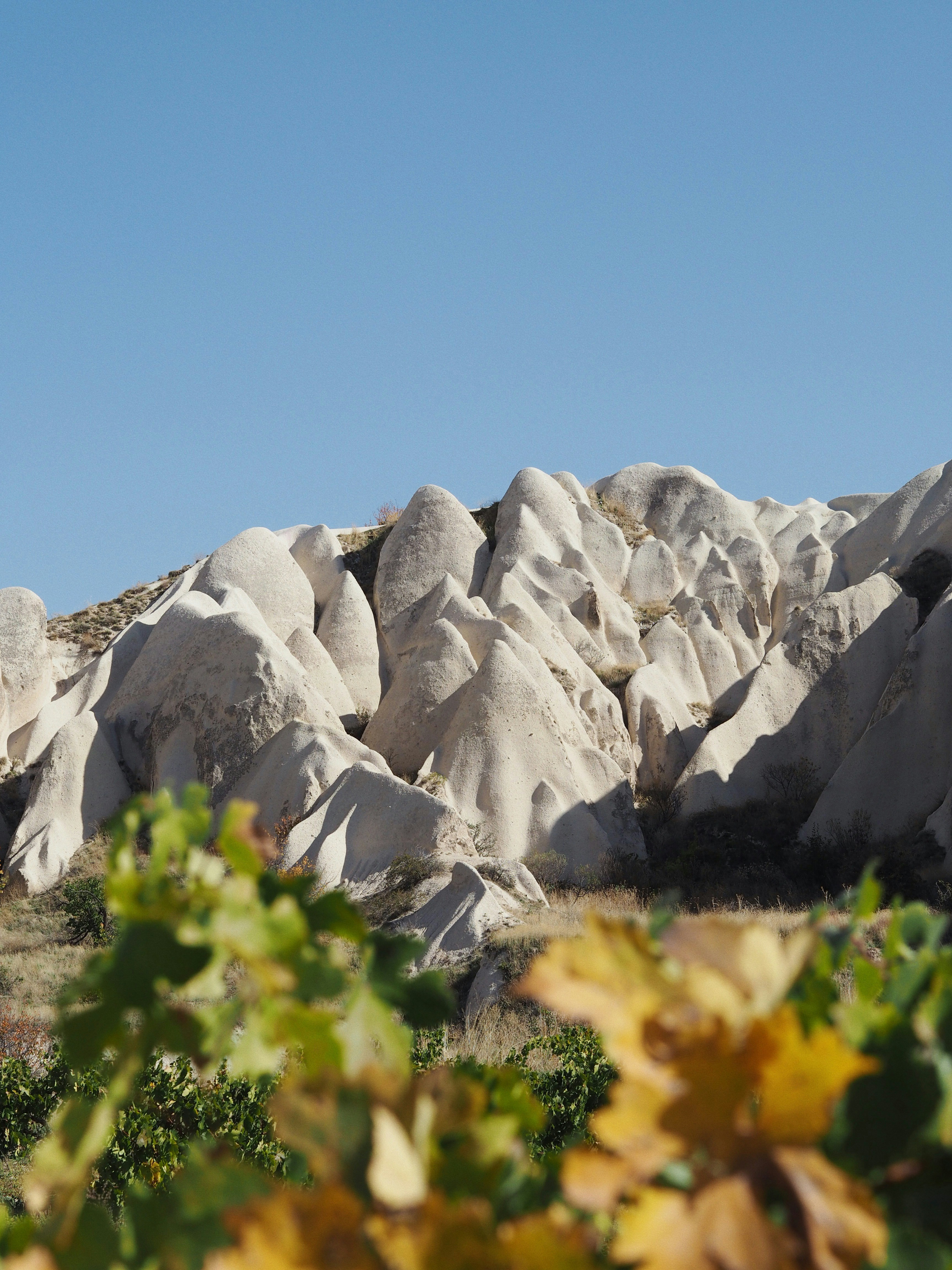Azure Skyline Over Weathered White Rock Spires