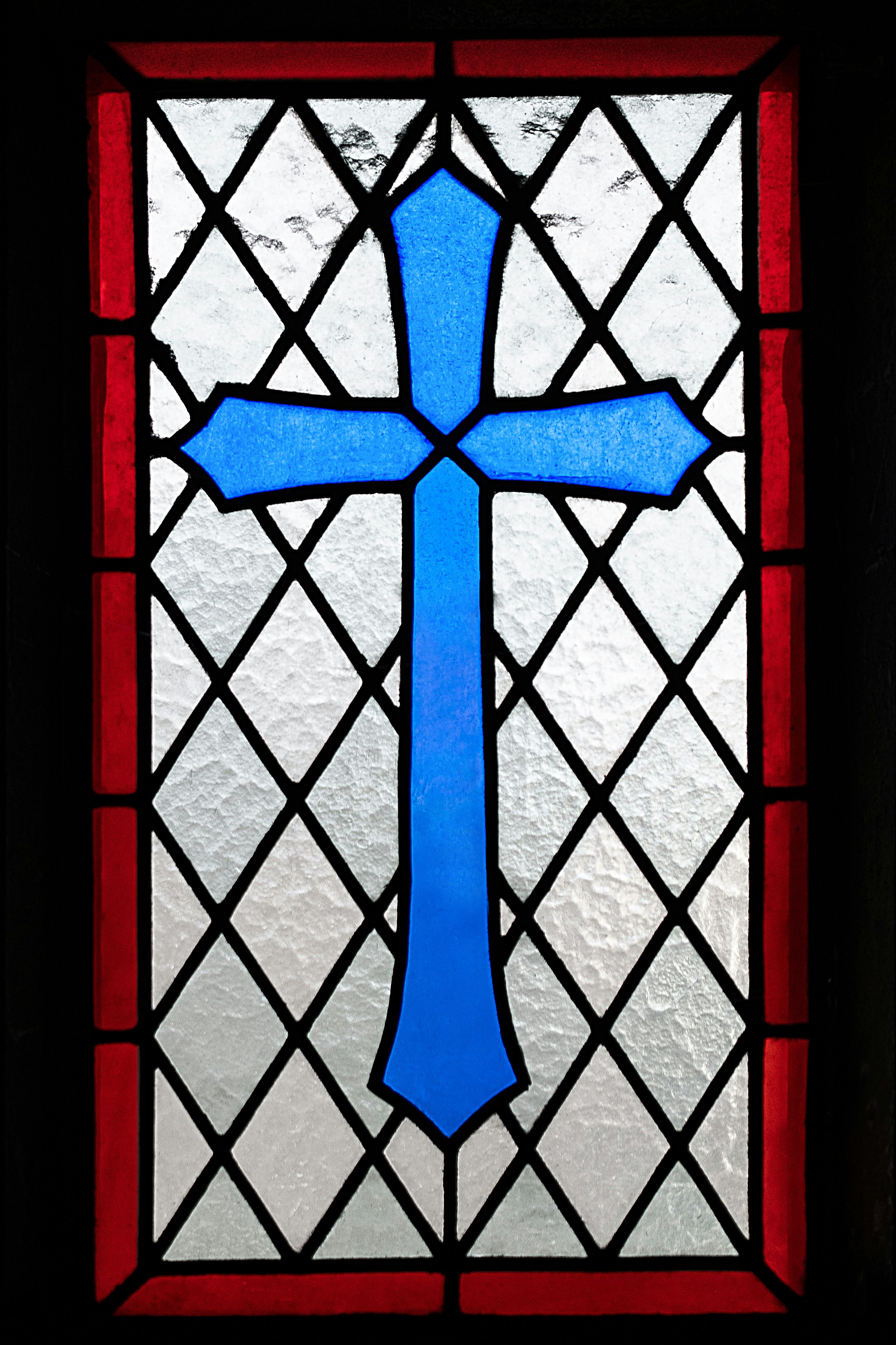 Azure Cross Framed by Diamond Glass in Ember-Red Border