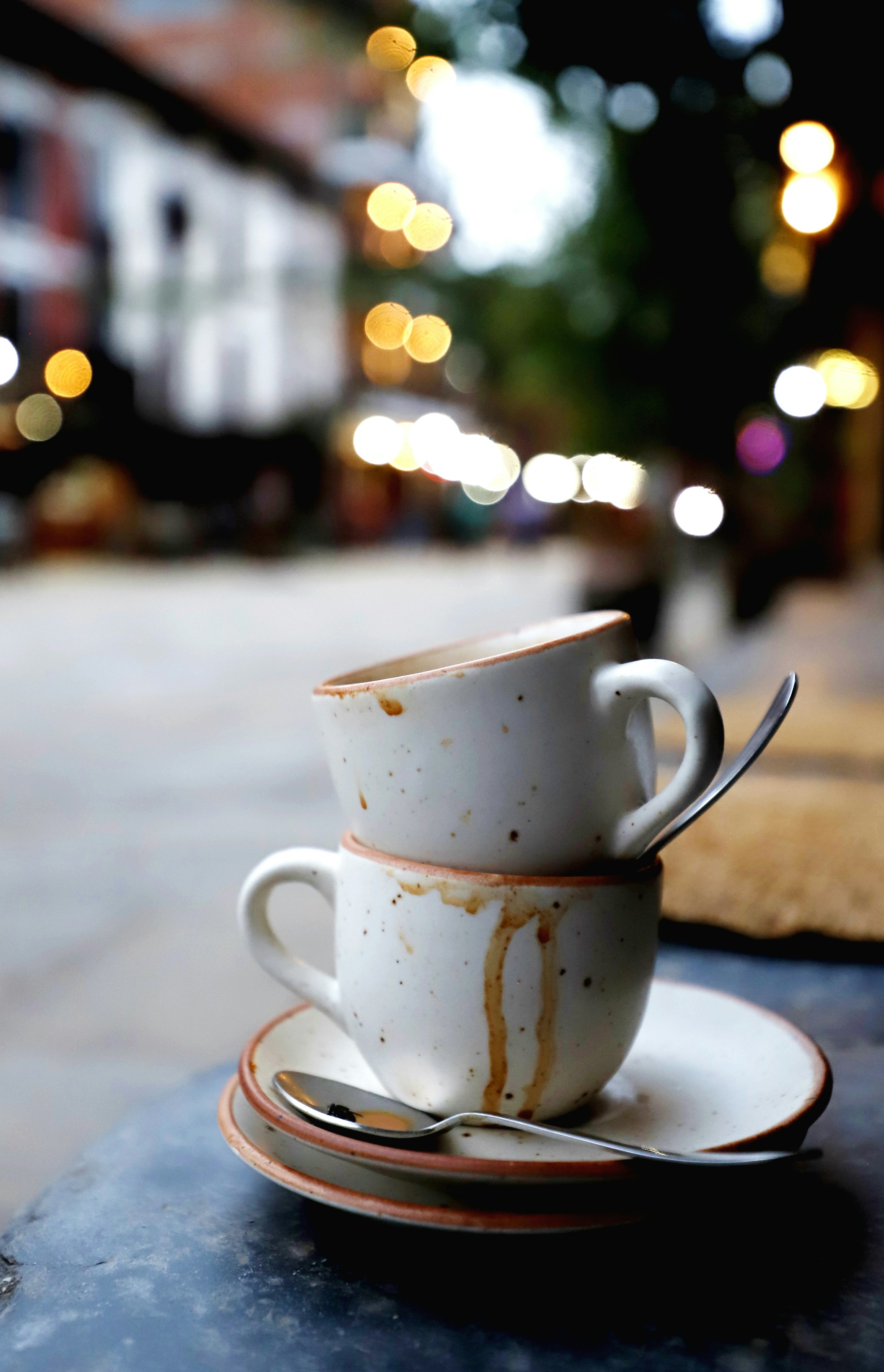 A couple of cups that are sitting on a table photo – Free Light Image ...