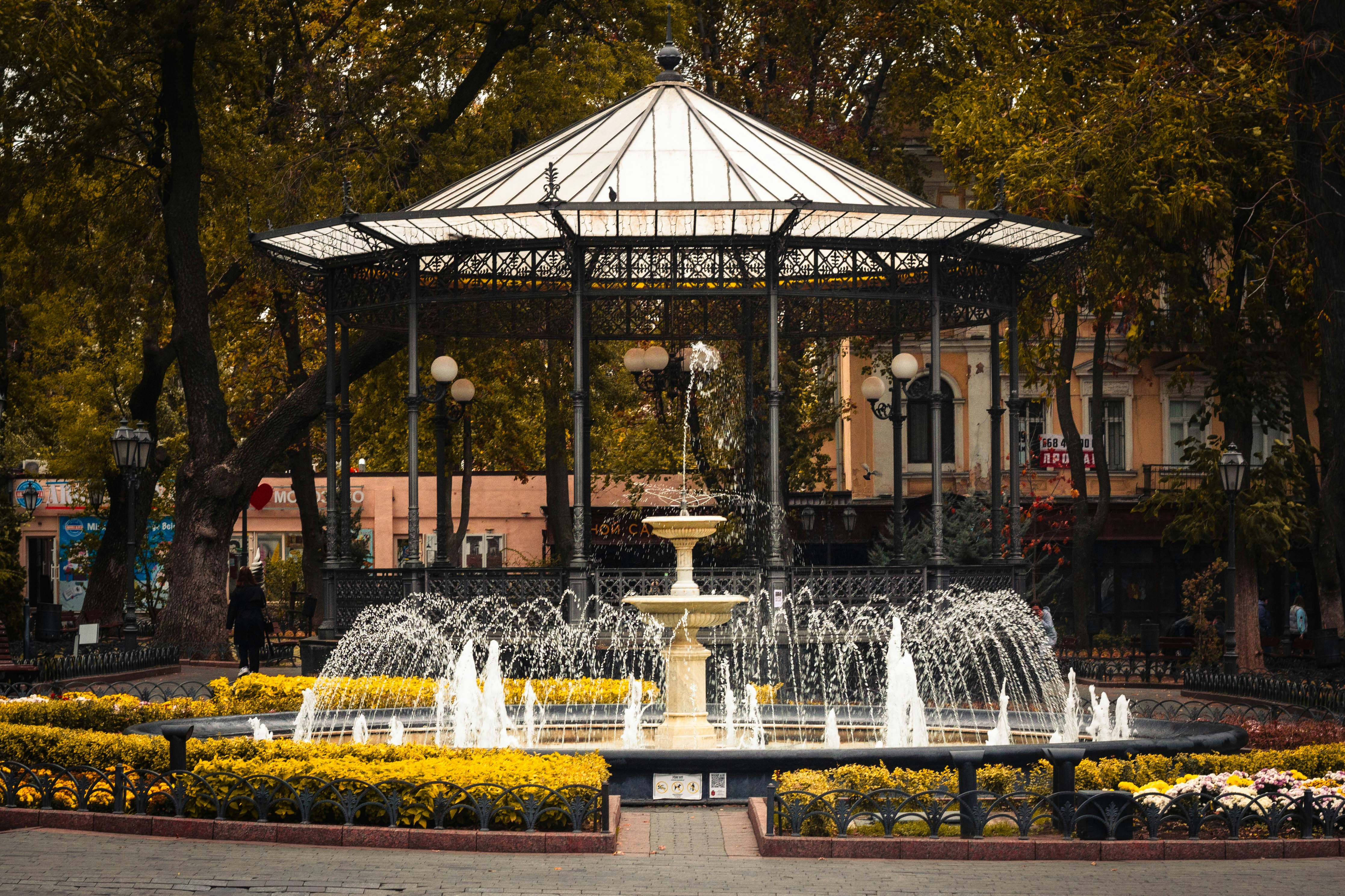 Symmetrical Fountain Pavilion: Autumn Park in Focus