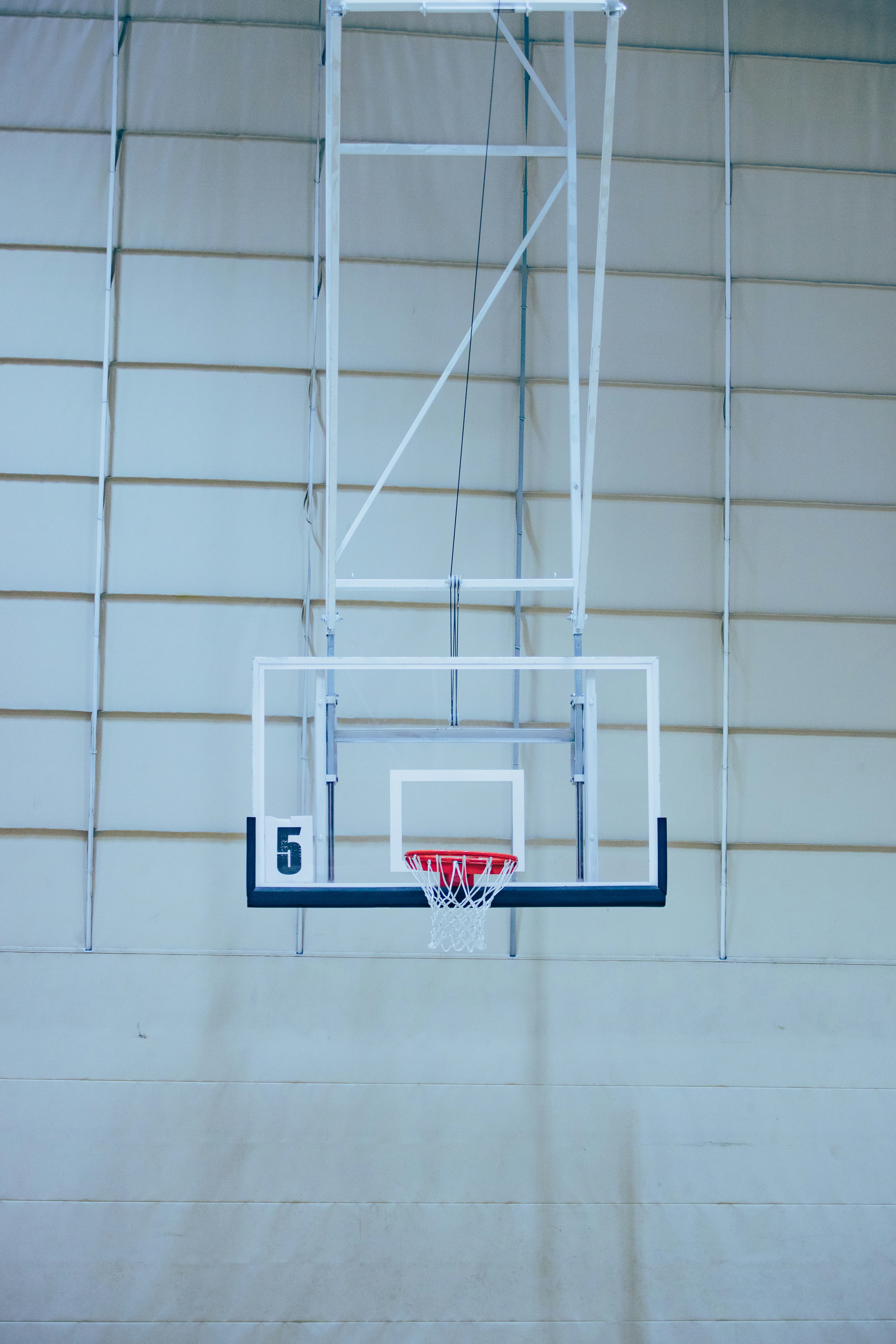 Framed Silence: Geometry of a Centered Hoop in an Indoor Gym