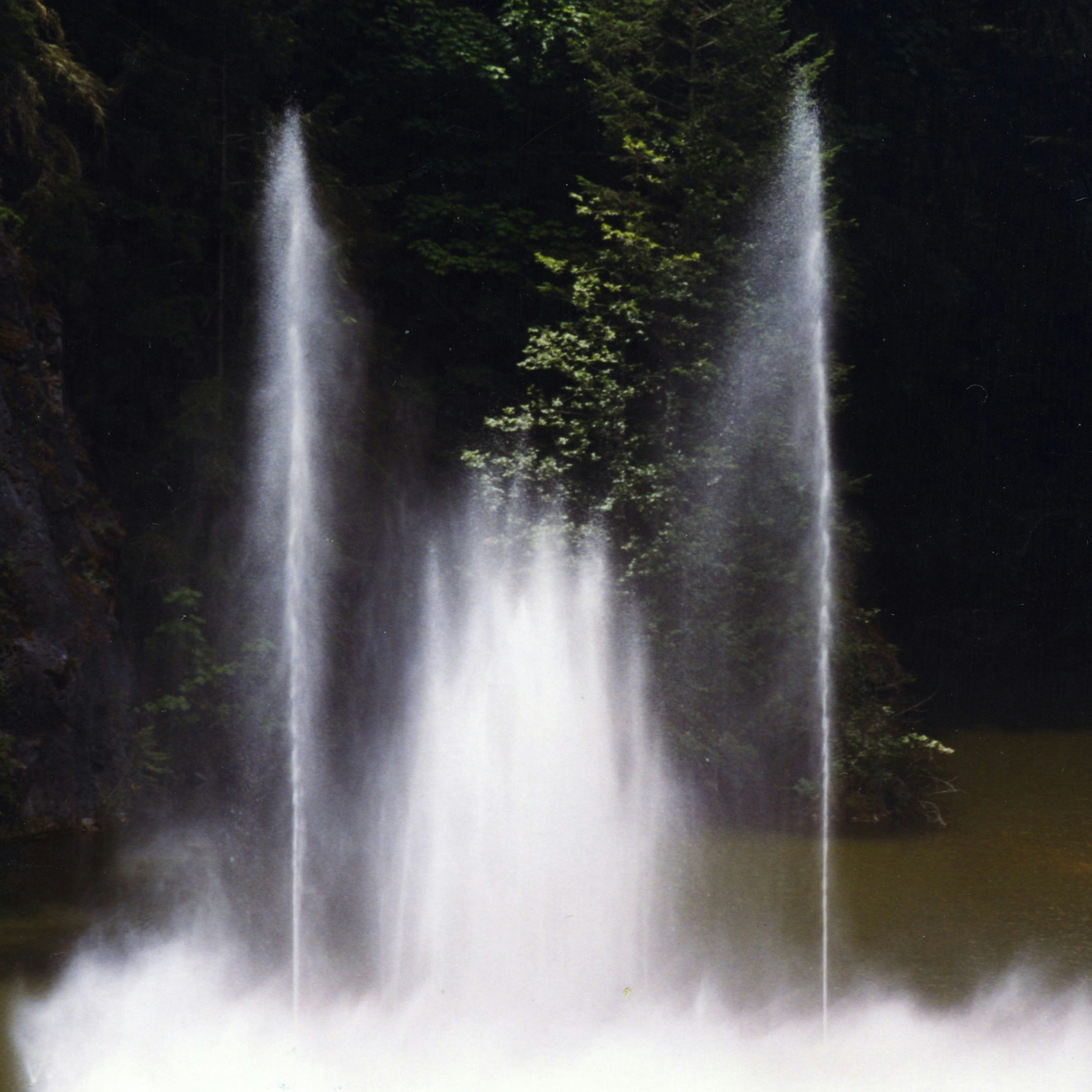 A group of fountains spewing water into a lake photo – Free Garden ...