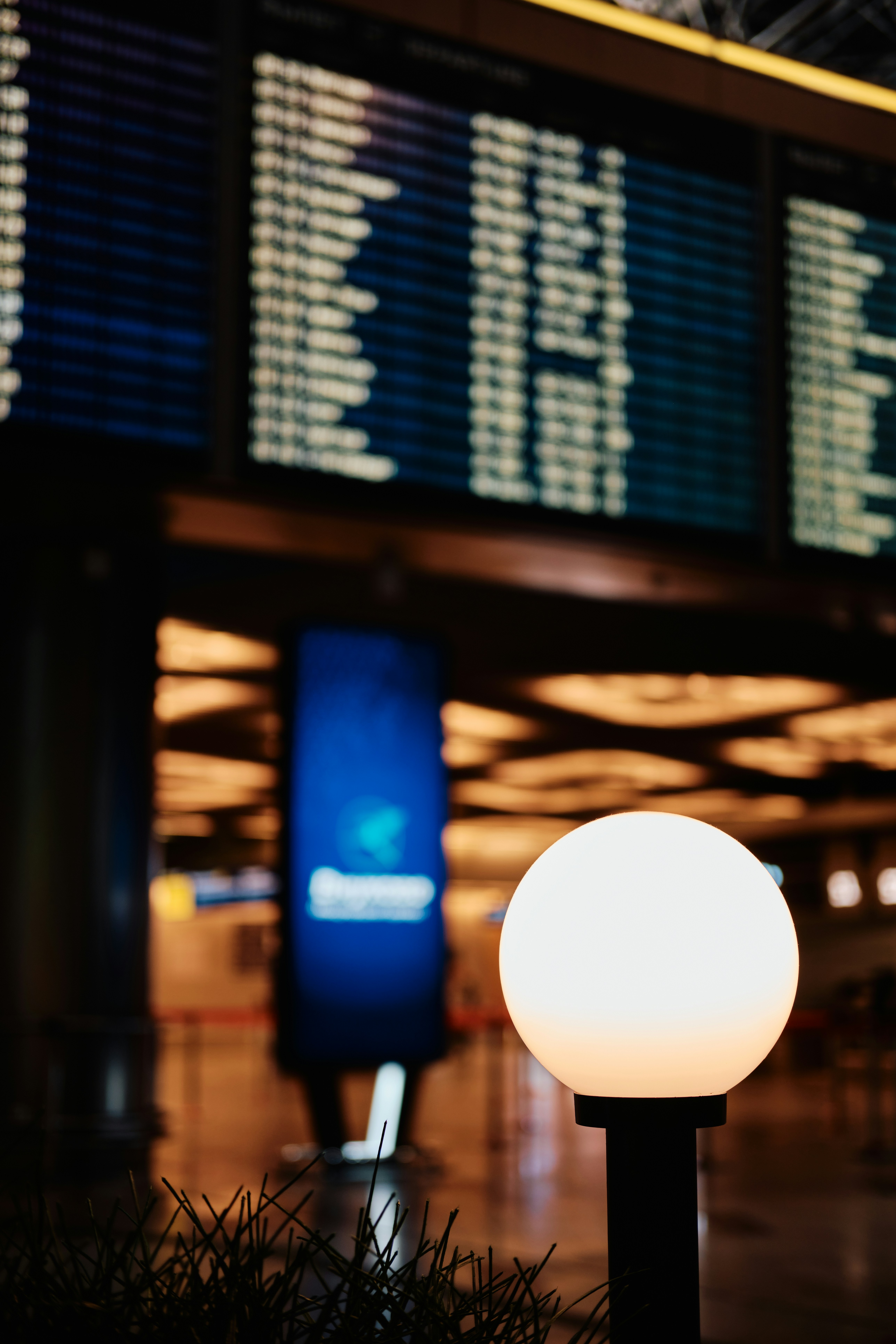 Soft-Glow Globe Anchors a Quiet Terminal Scene