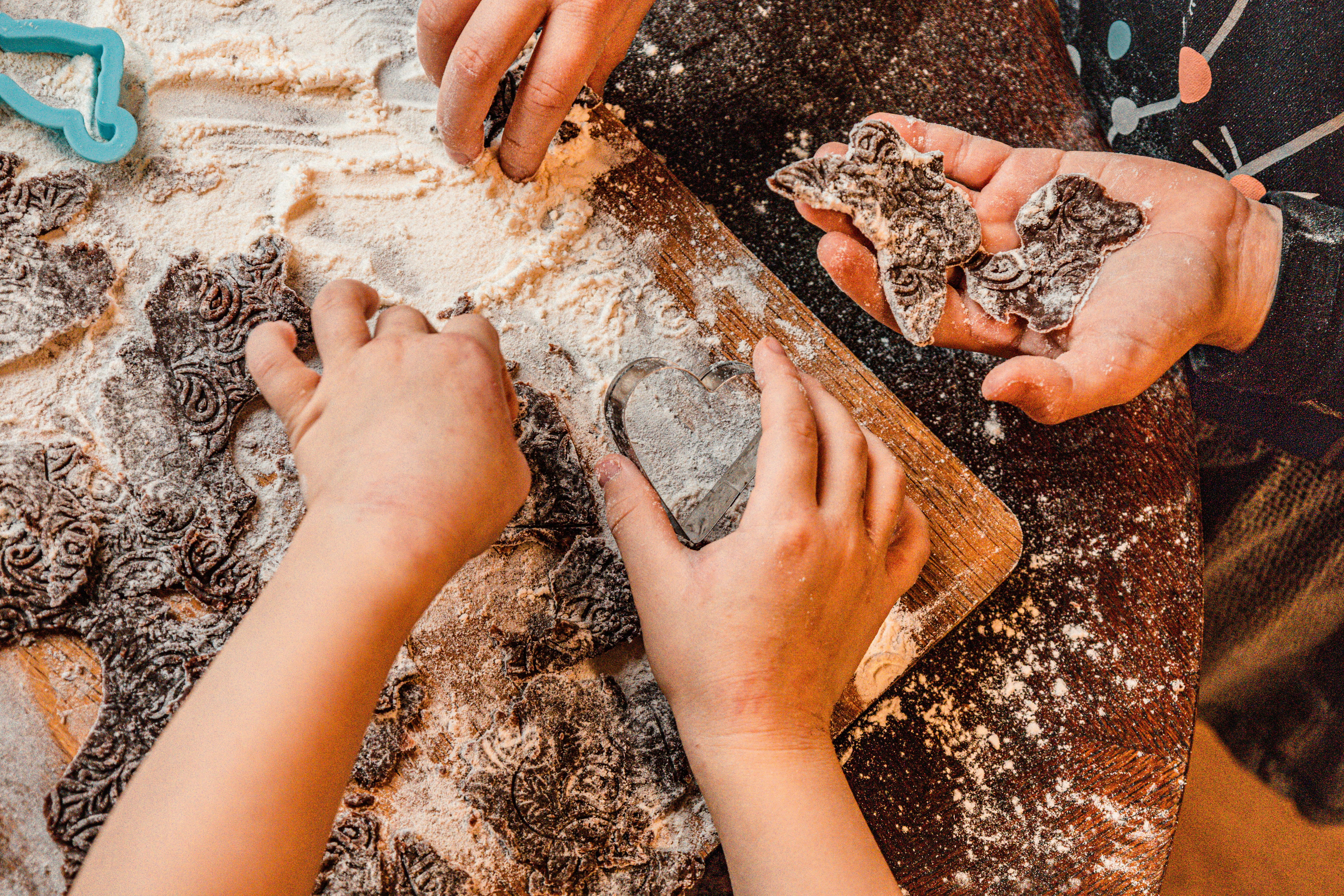 Dust and Dough: Hands Craft Tiny Clay Shapes on a Flour-Dusted Board