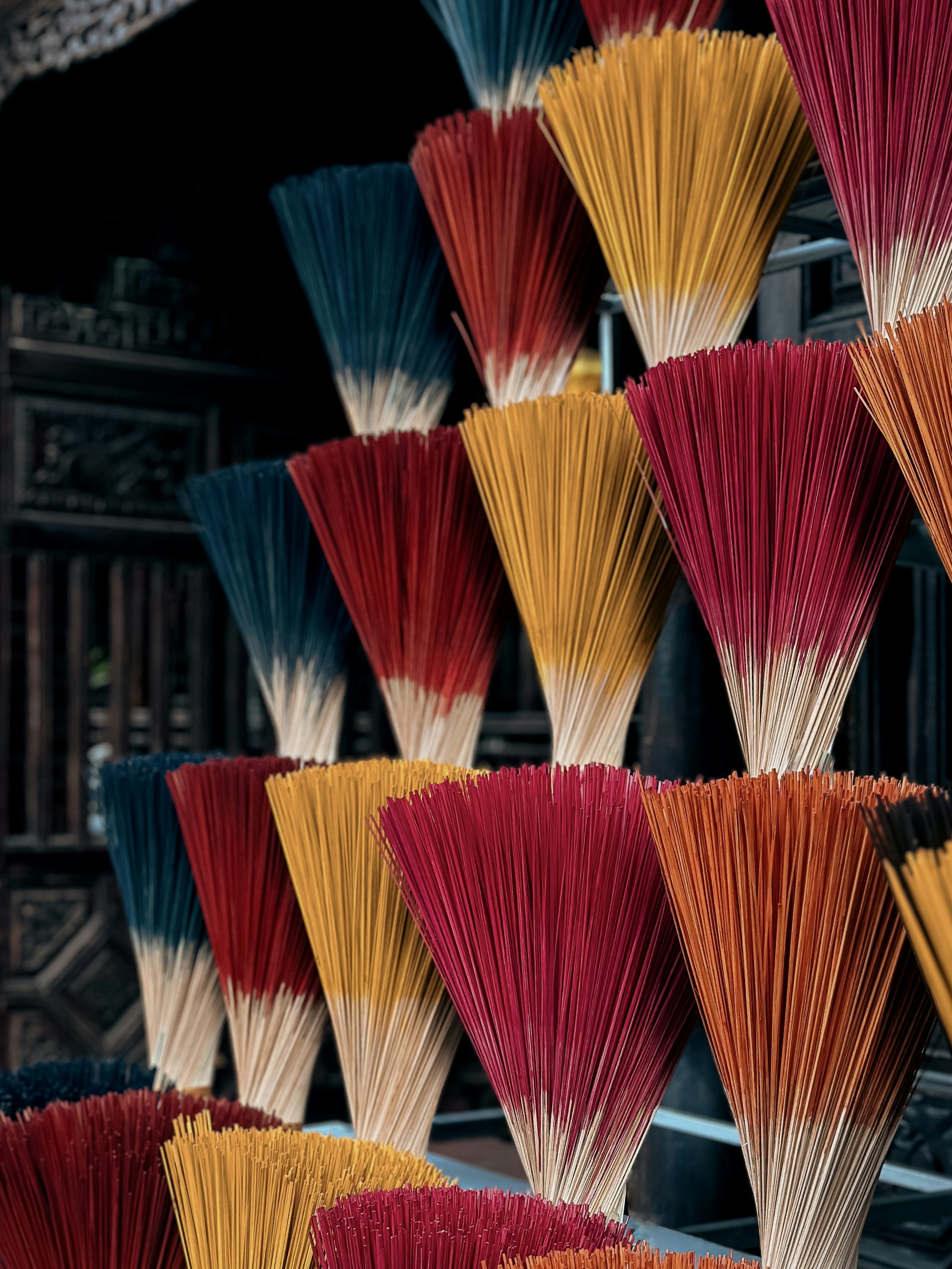 A bunch of different colored straws sitting on top of each other photo ...