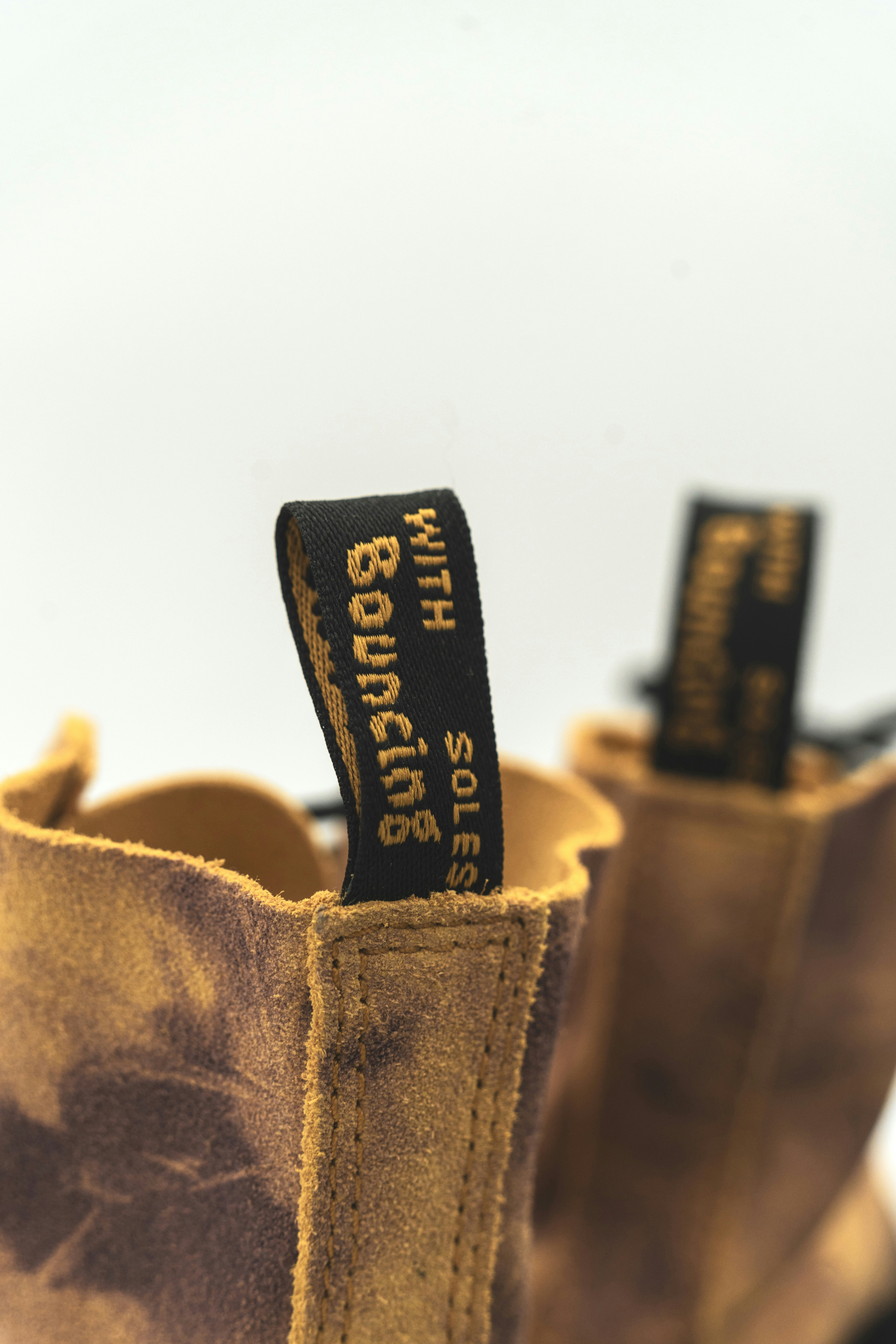 Quiet Craftsmanship: Suede Boot Pull-Tab in Focus