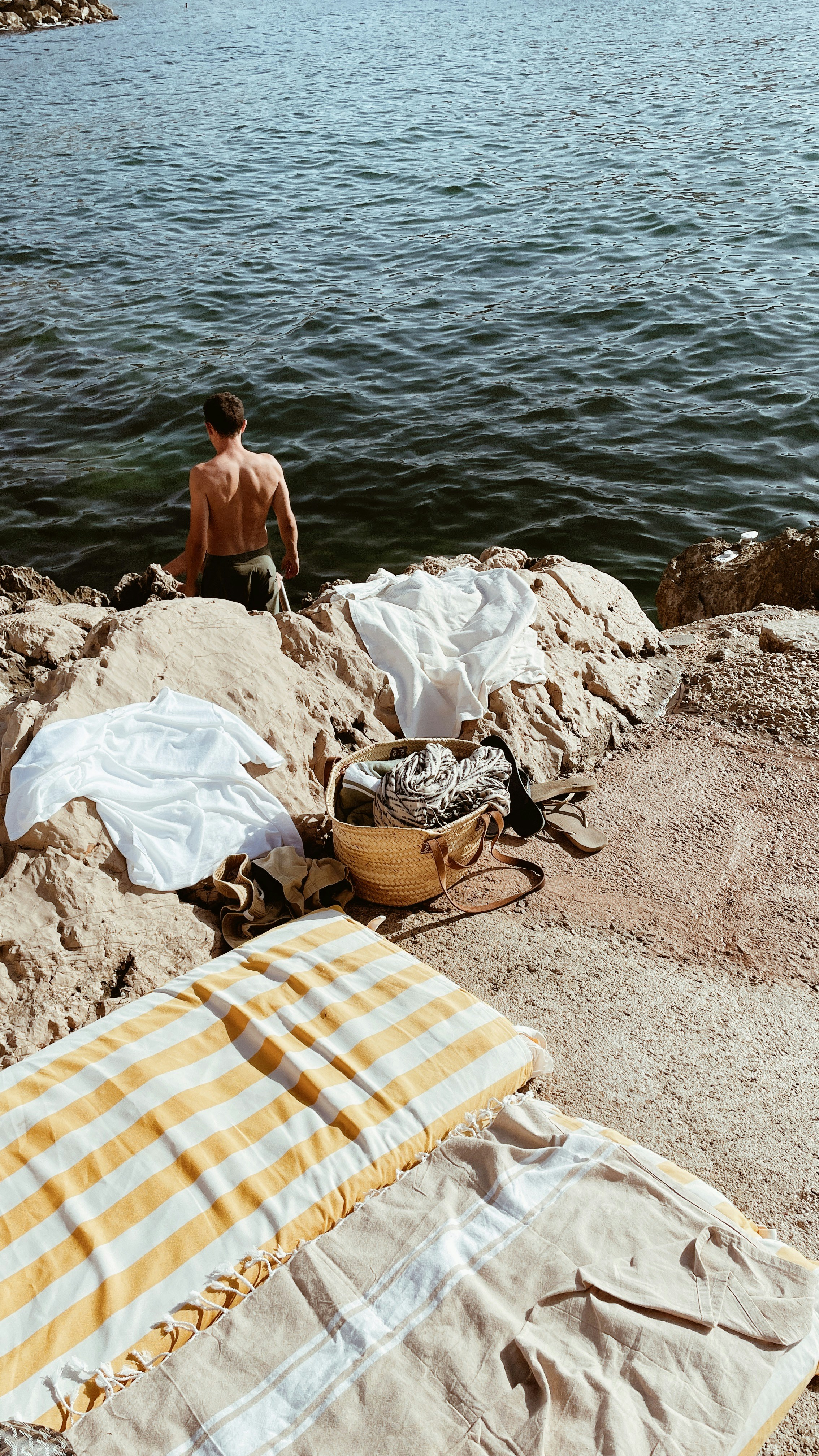 Shoreline Quiet: A Lone Moment by the Sea