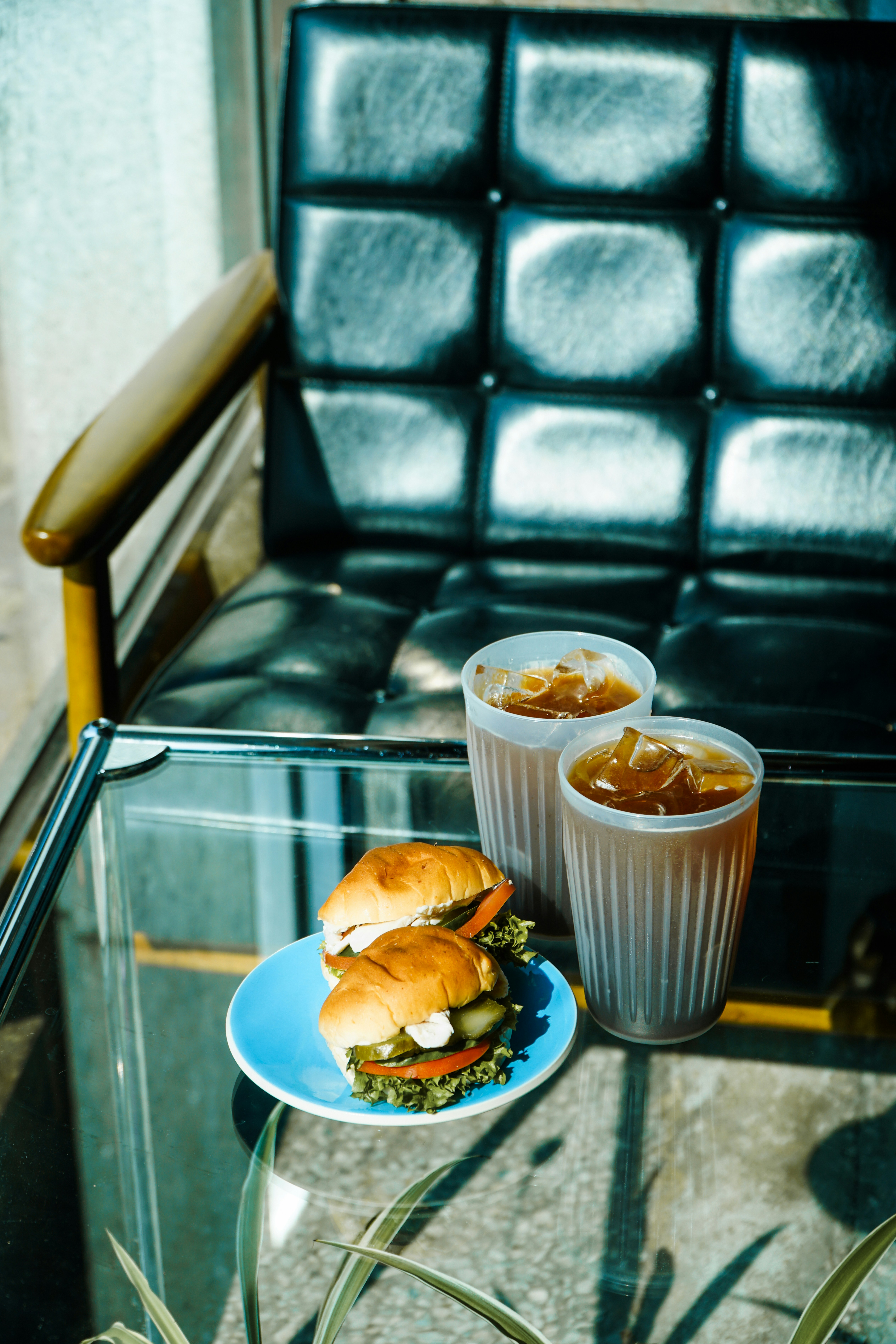 Avocado-green Ottoman: A Bistro Moment with Burgers and Iced Coffee