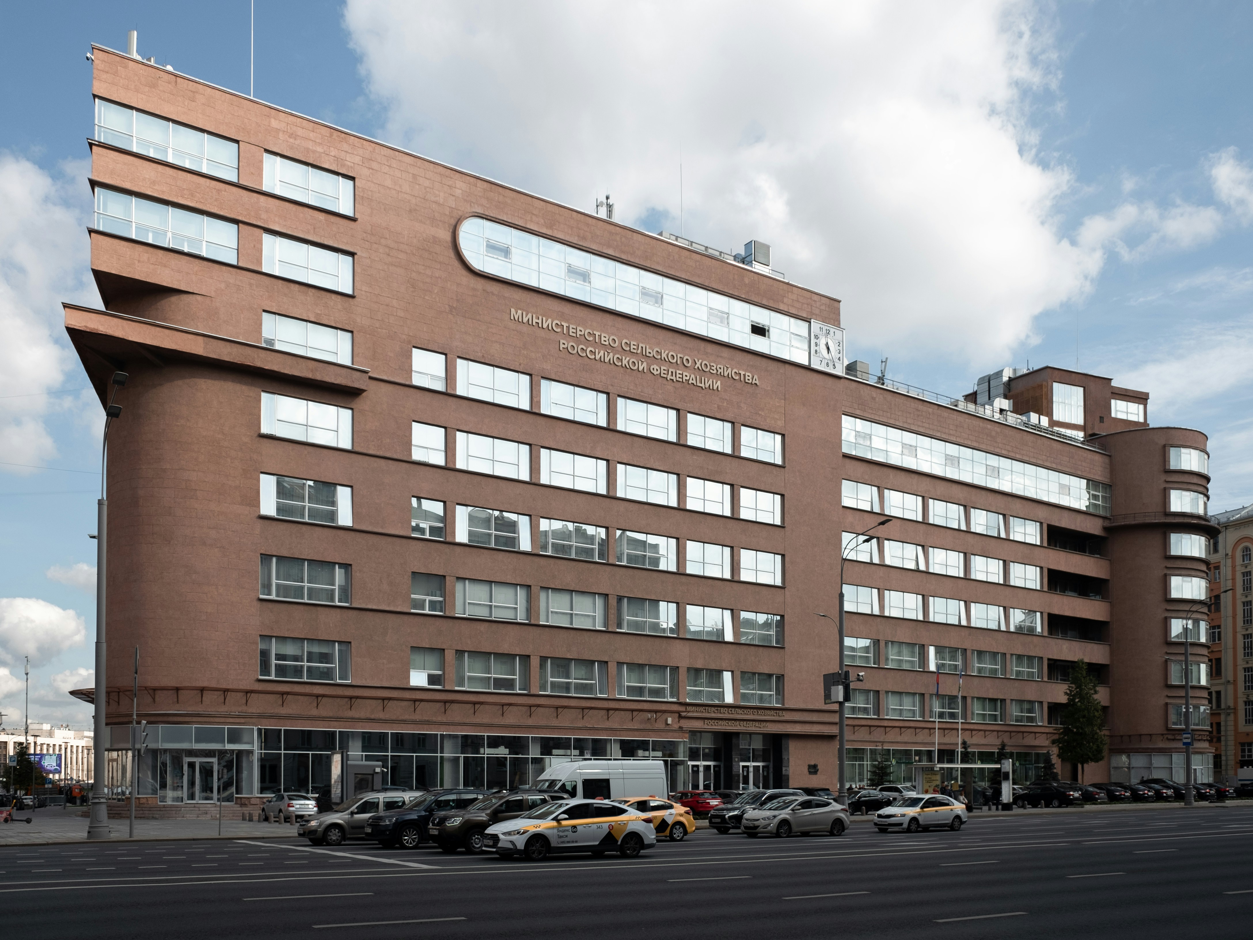 A large brown building with lots of windows photo – Free Russia Image ...