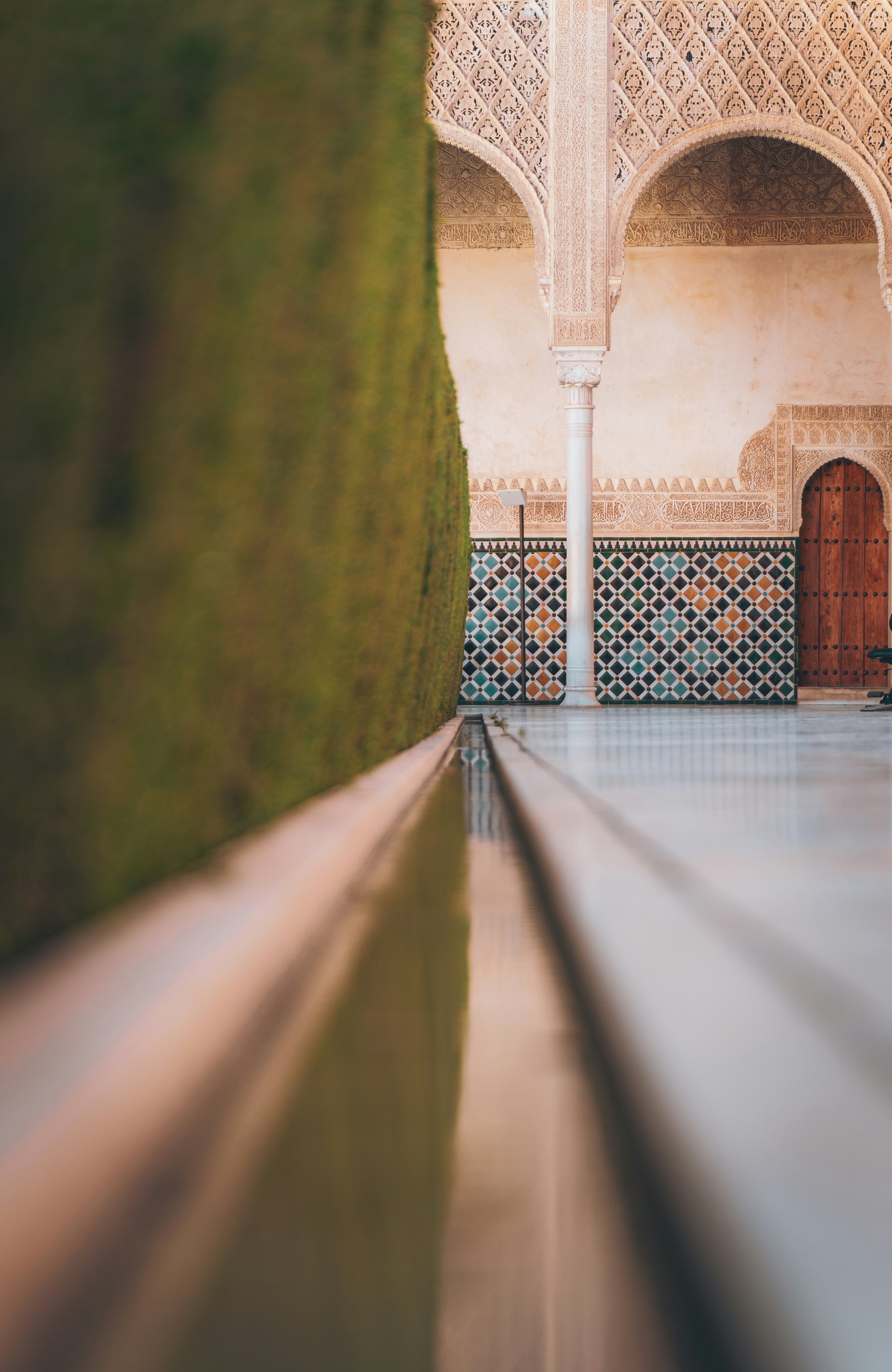 A building with a pool in the middle of it photo – Free Alhambra Image ...