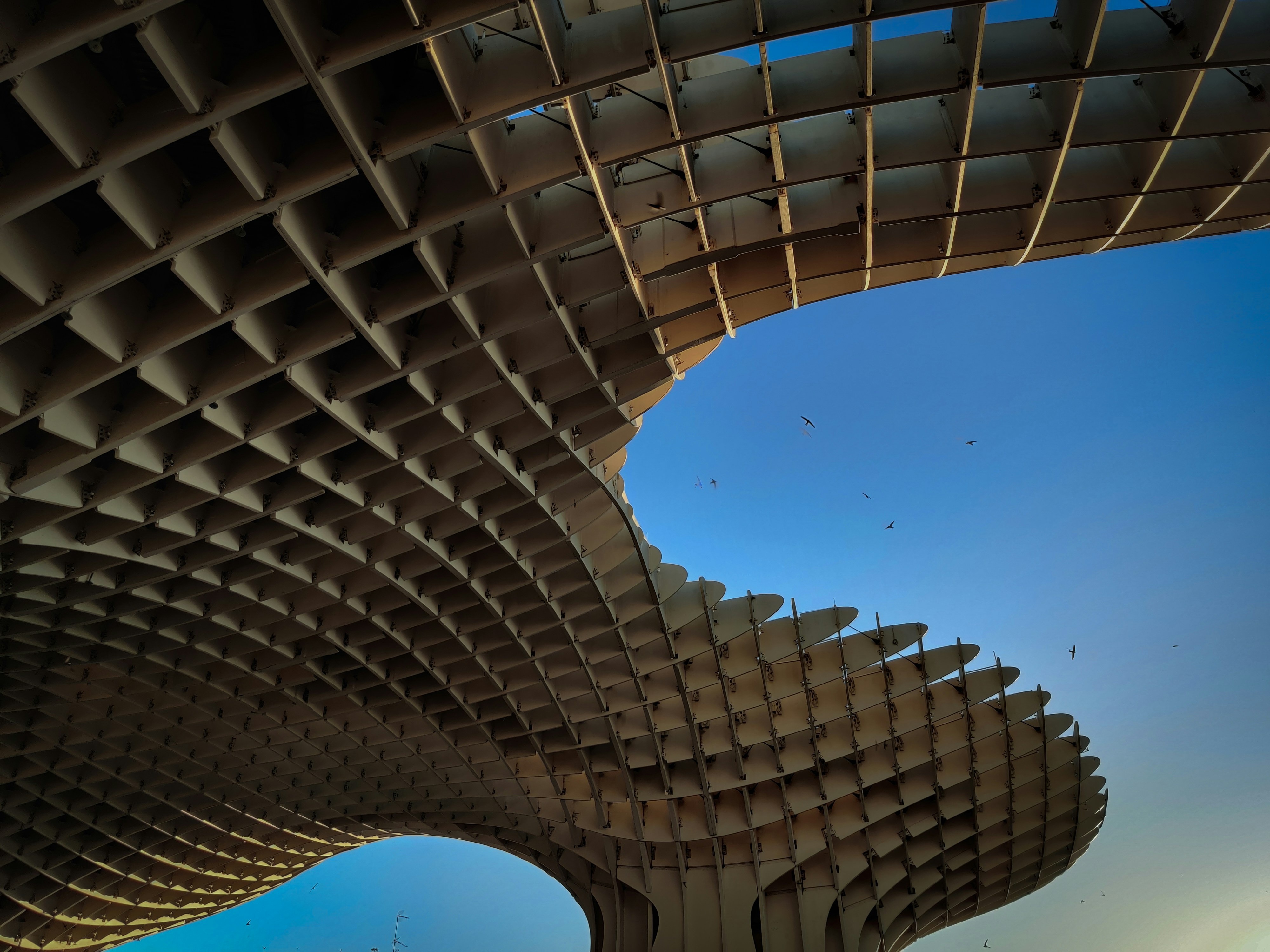 A very large structure with a sky in the background photo – Free Art ...