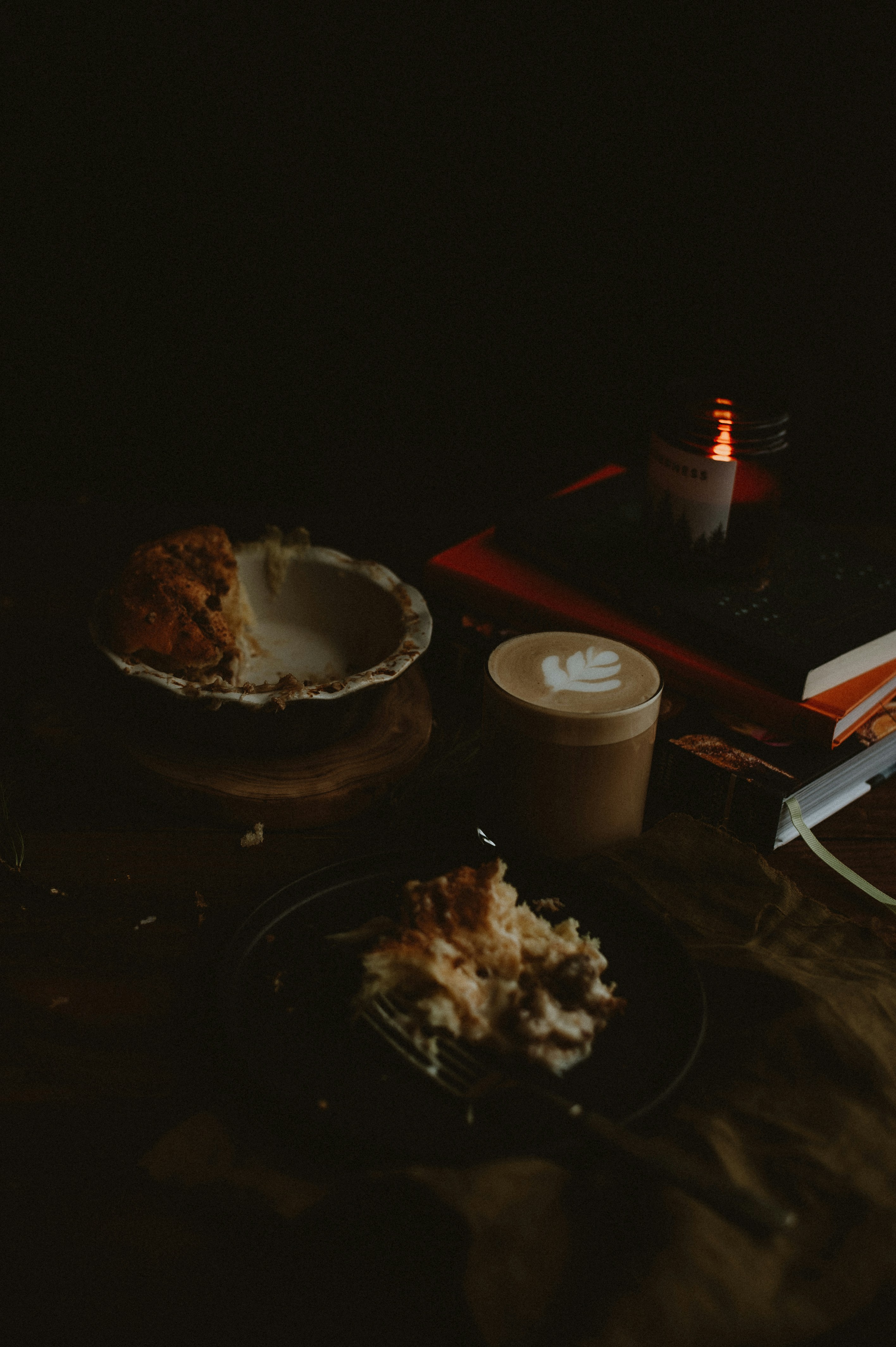 Dim Café Corner: A Slice, a Latte, and Quiet Glow
