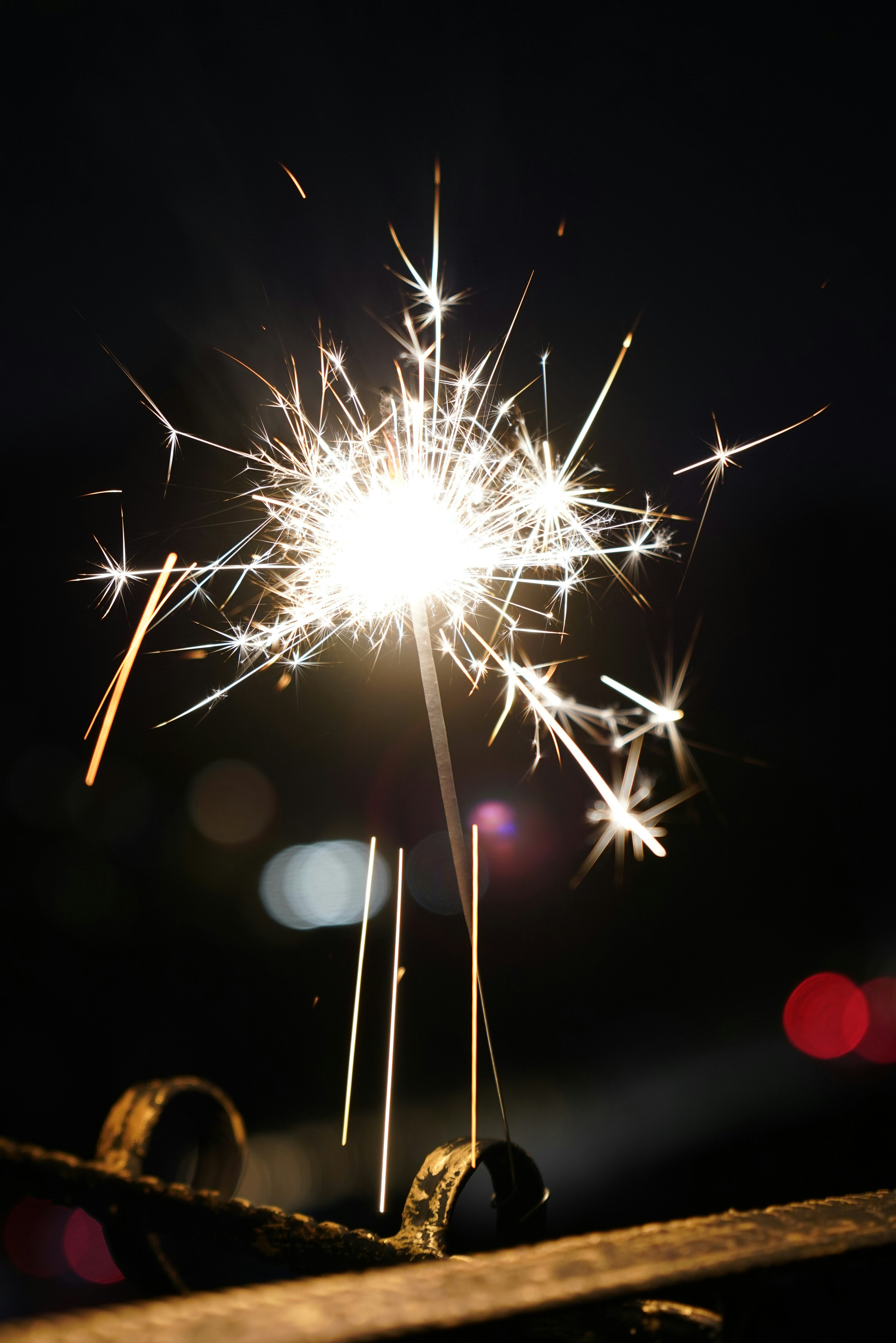 A close up of a sparkler on a black background photo – Free Fireworks ...