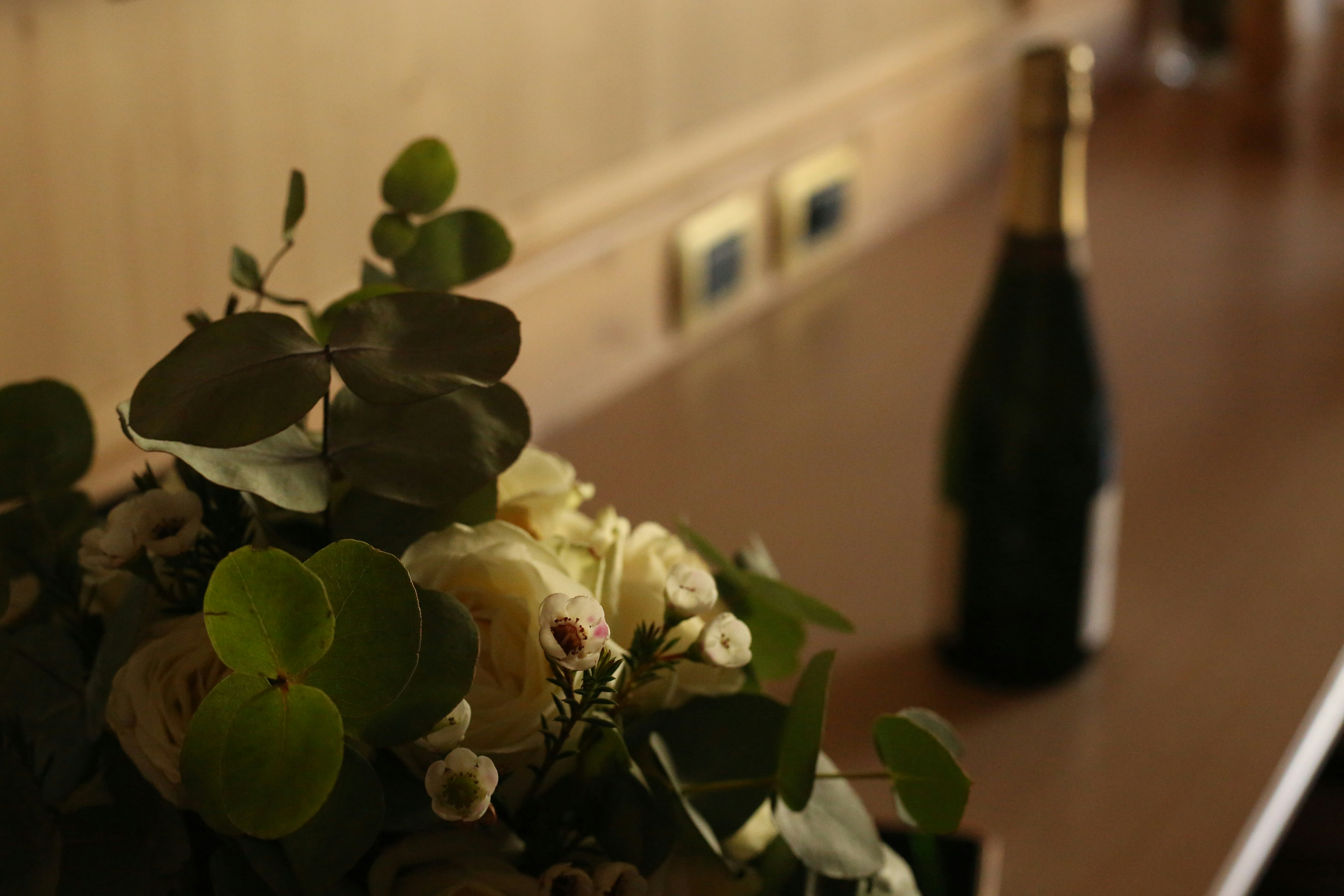 Amber Hour Bouquet: Close-Up Florals in a Warm Indoor Glow
