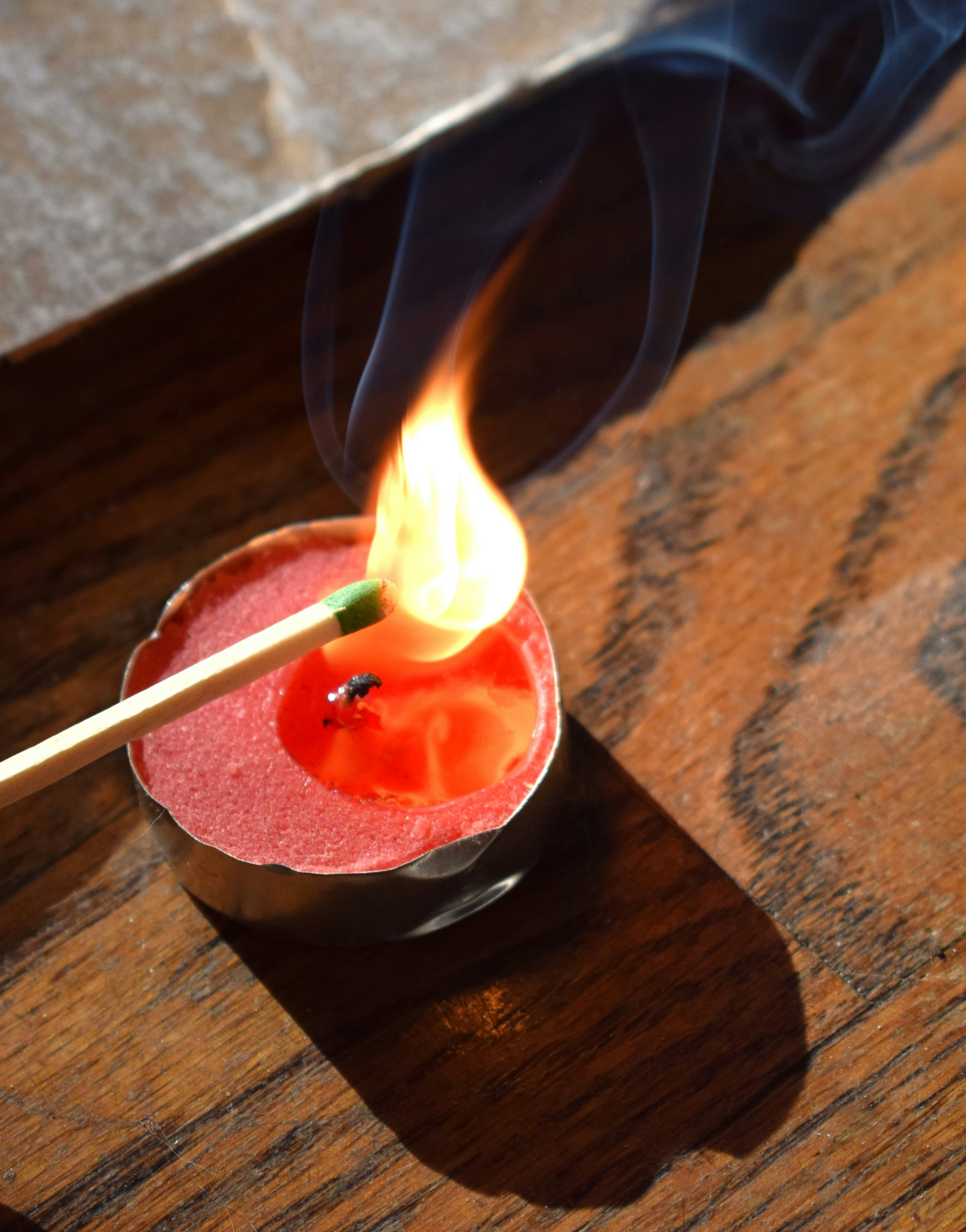 A small cup with a match stick sticking out of it photo – Free Fire ...