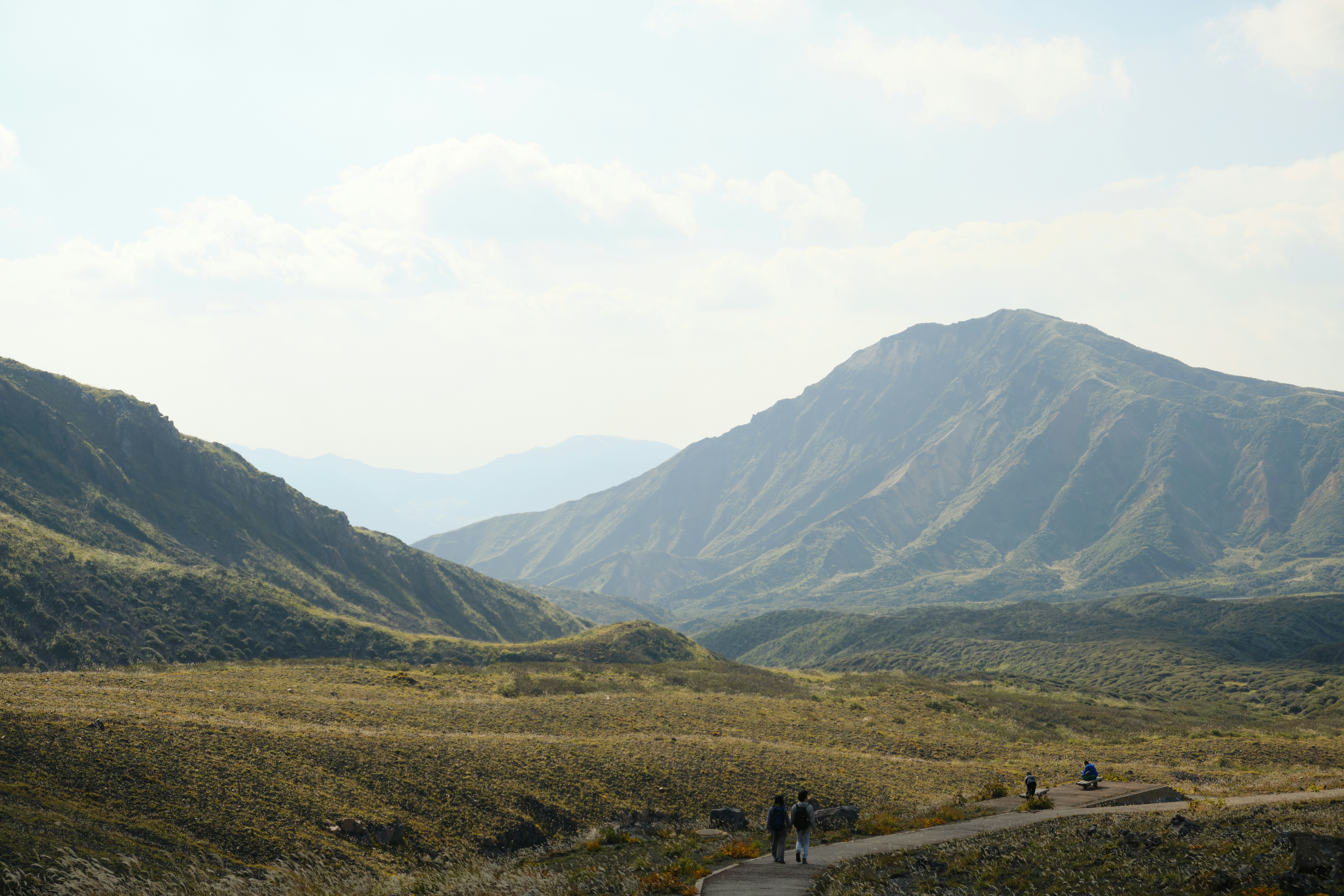 A group of people walking down a dirt road photo – Free Japan Image on ...