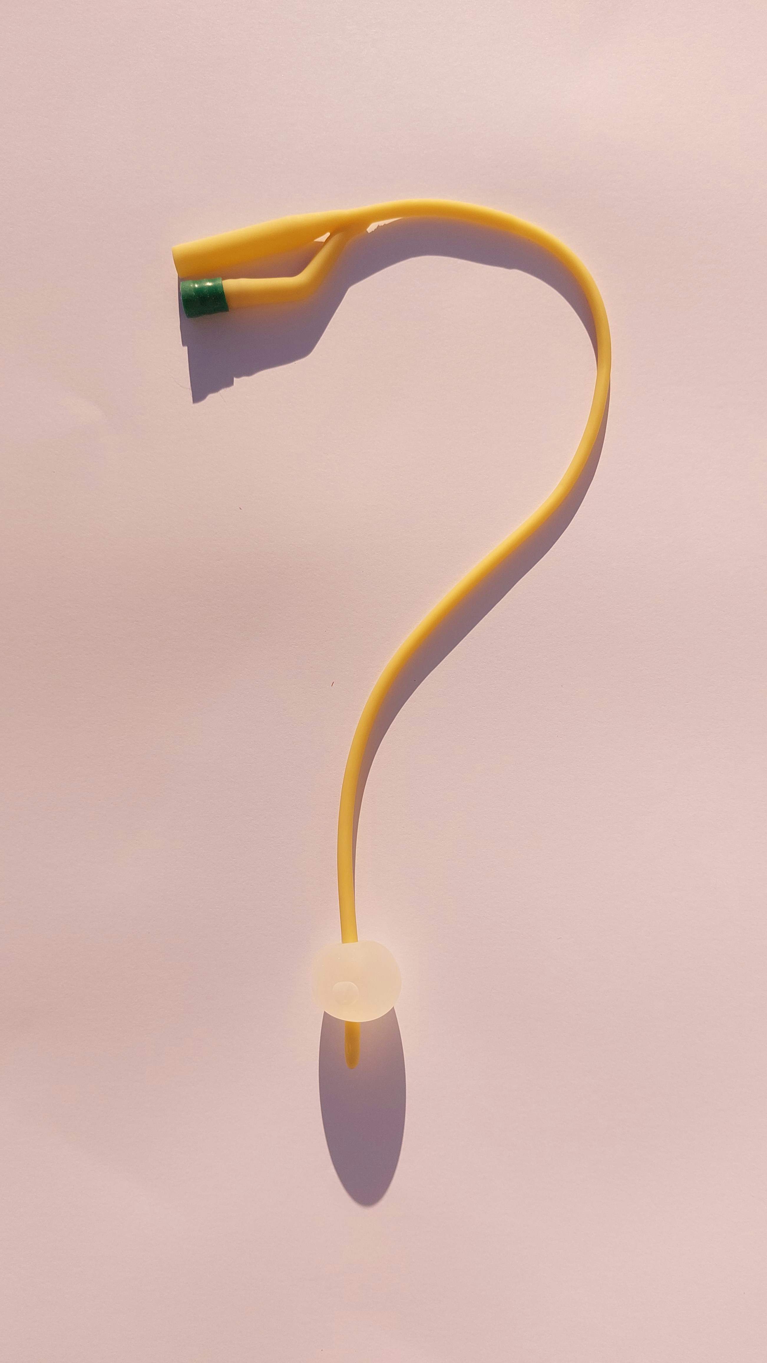 A yellow cord connected to a white object photo – Free Appliance Image ...