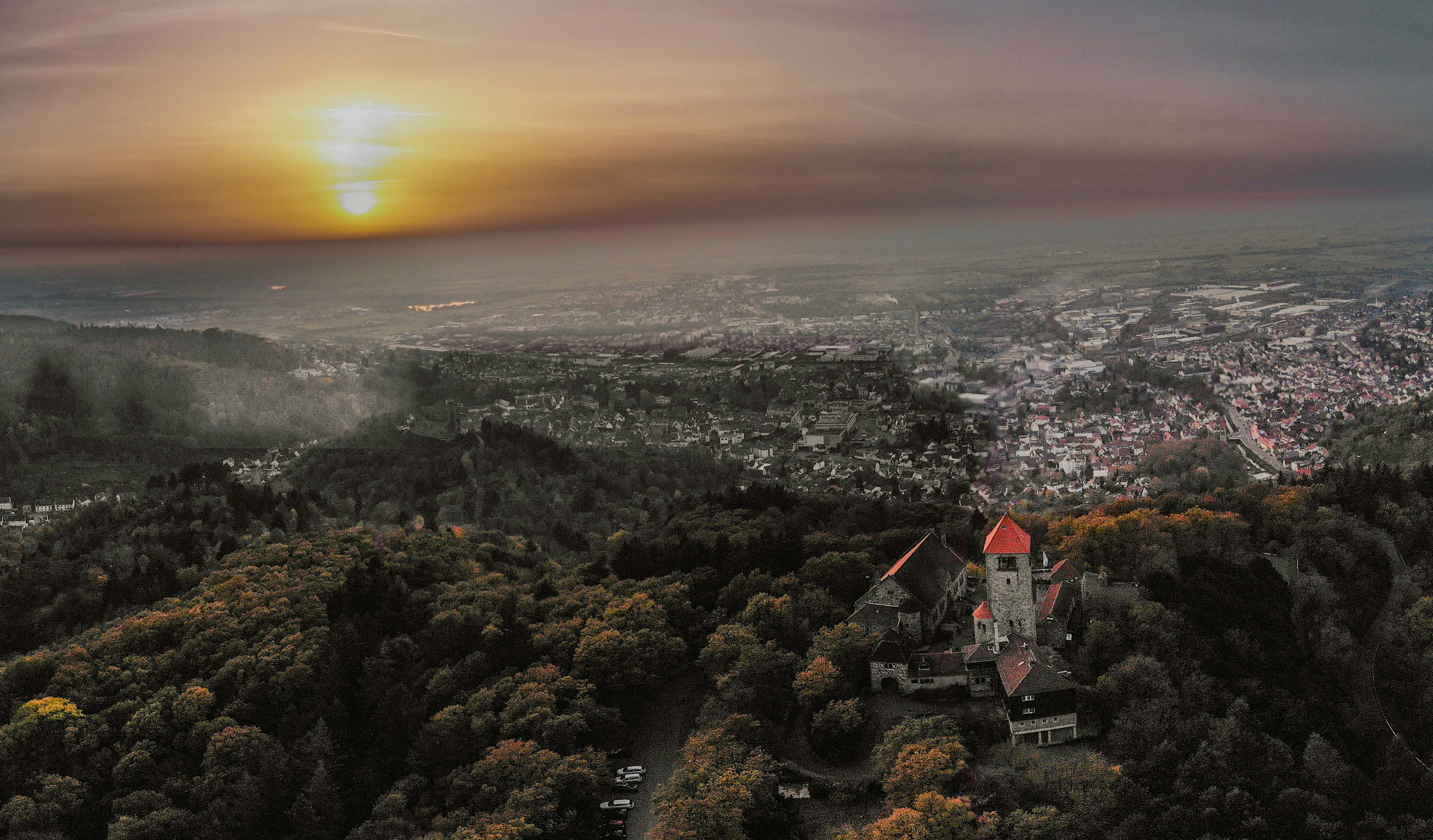 Hilltop Fortress at Dusk: A Sunset Over the Sleeping City